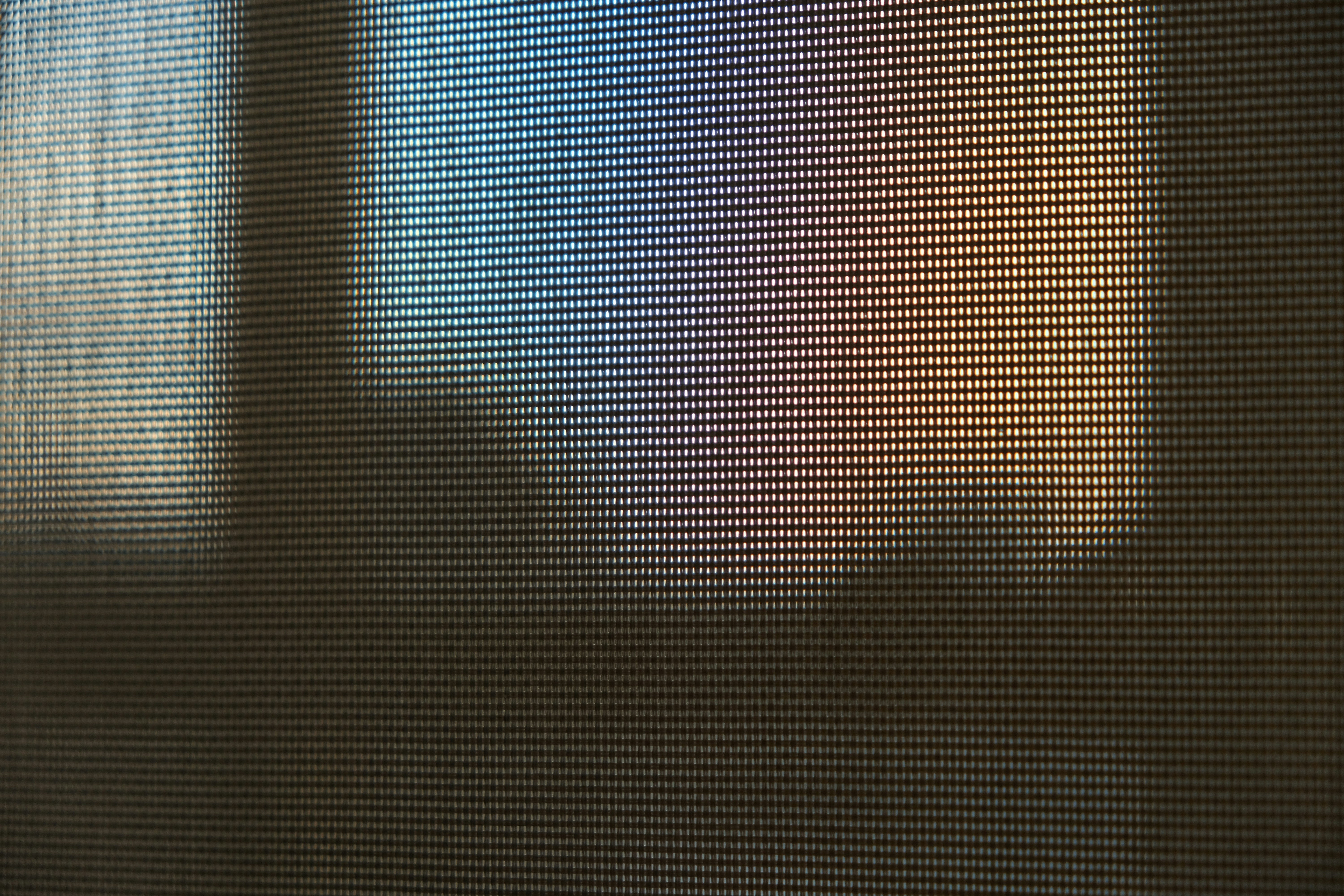 Hidden City Grid: Window Light through Fine Mesh