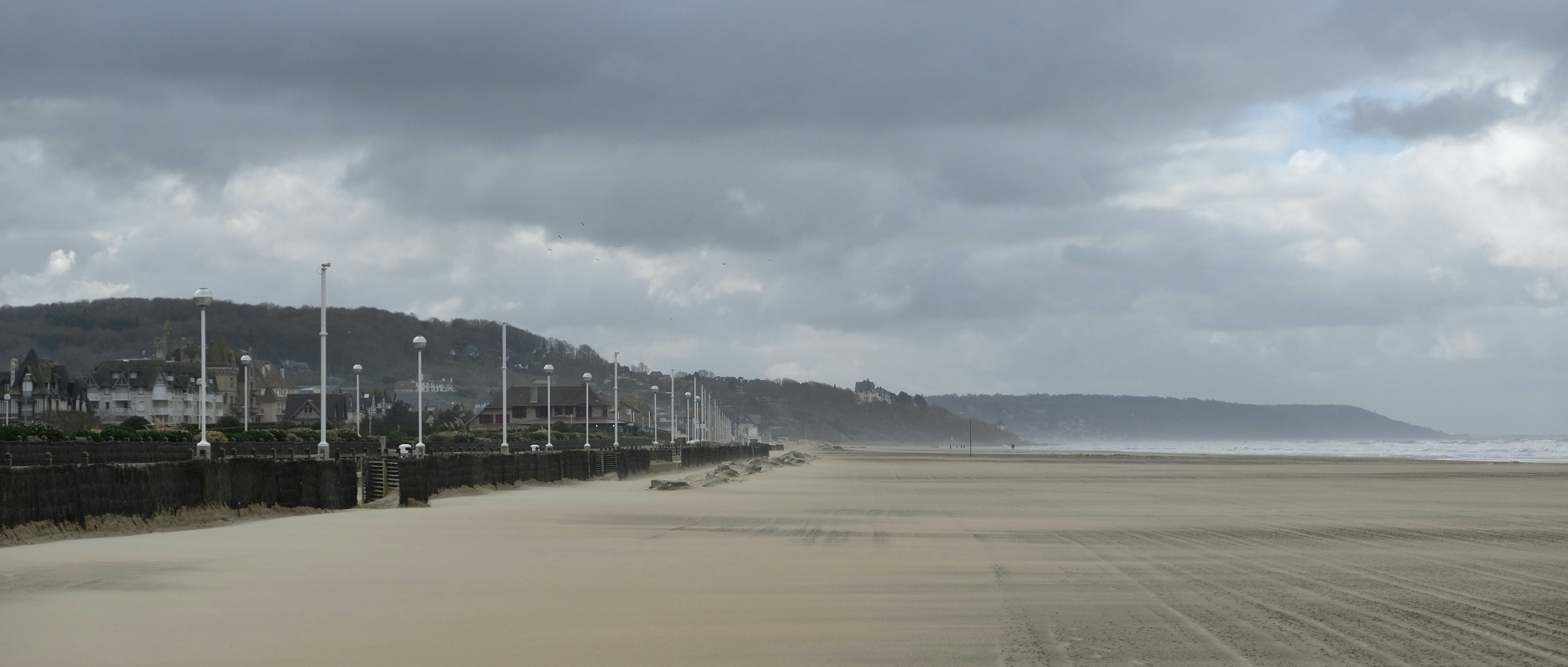 Line of Lamps along the Quiet Beach Front