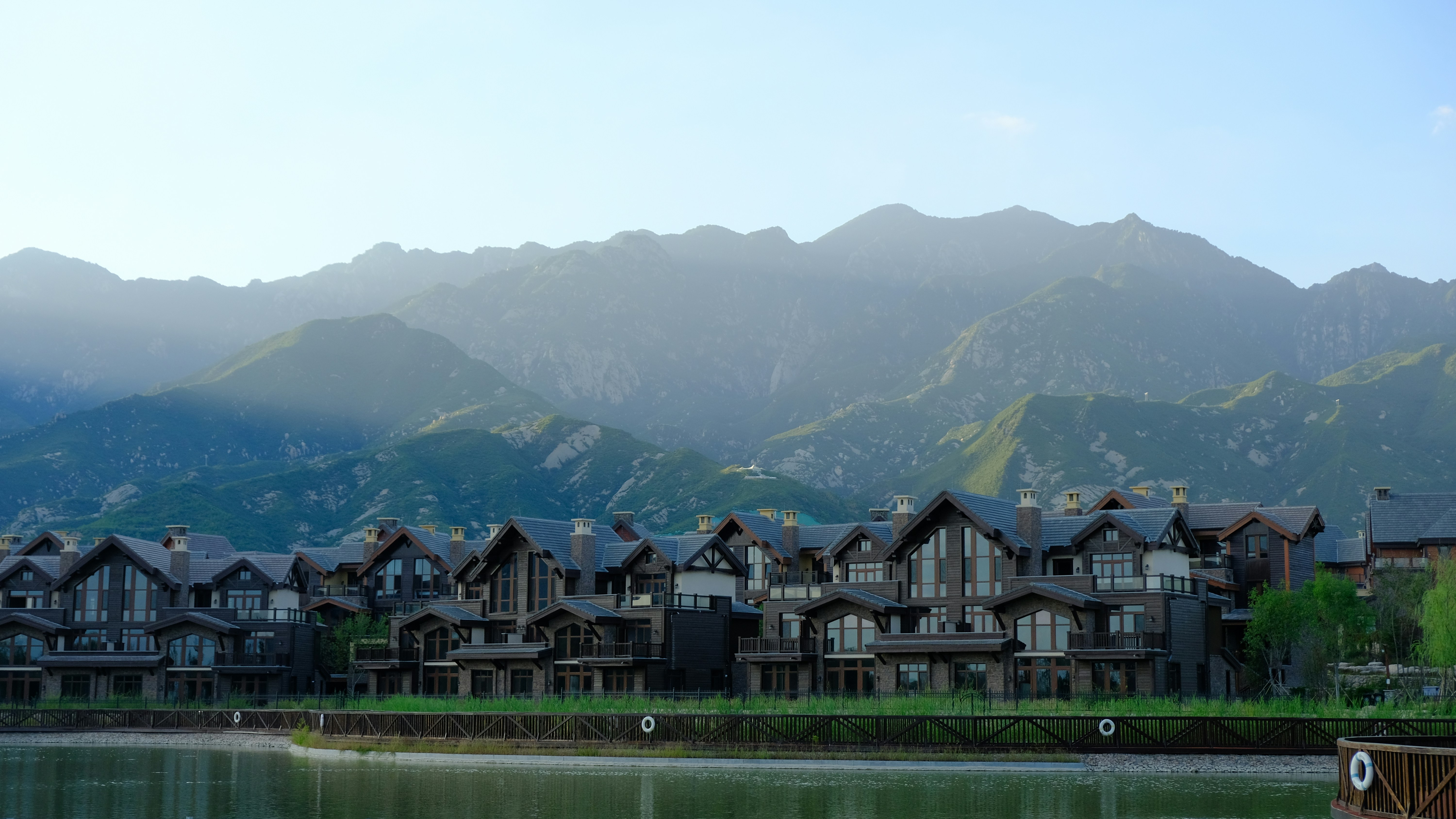 Lakeside Village Crowned by Mountain Veil