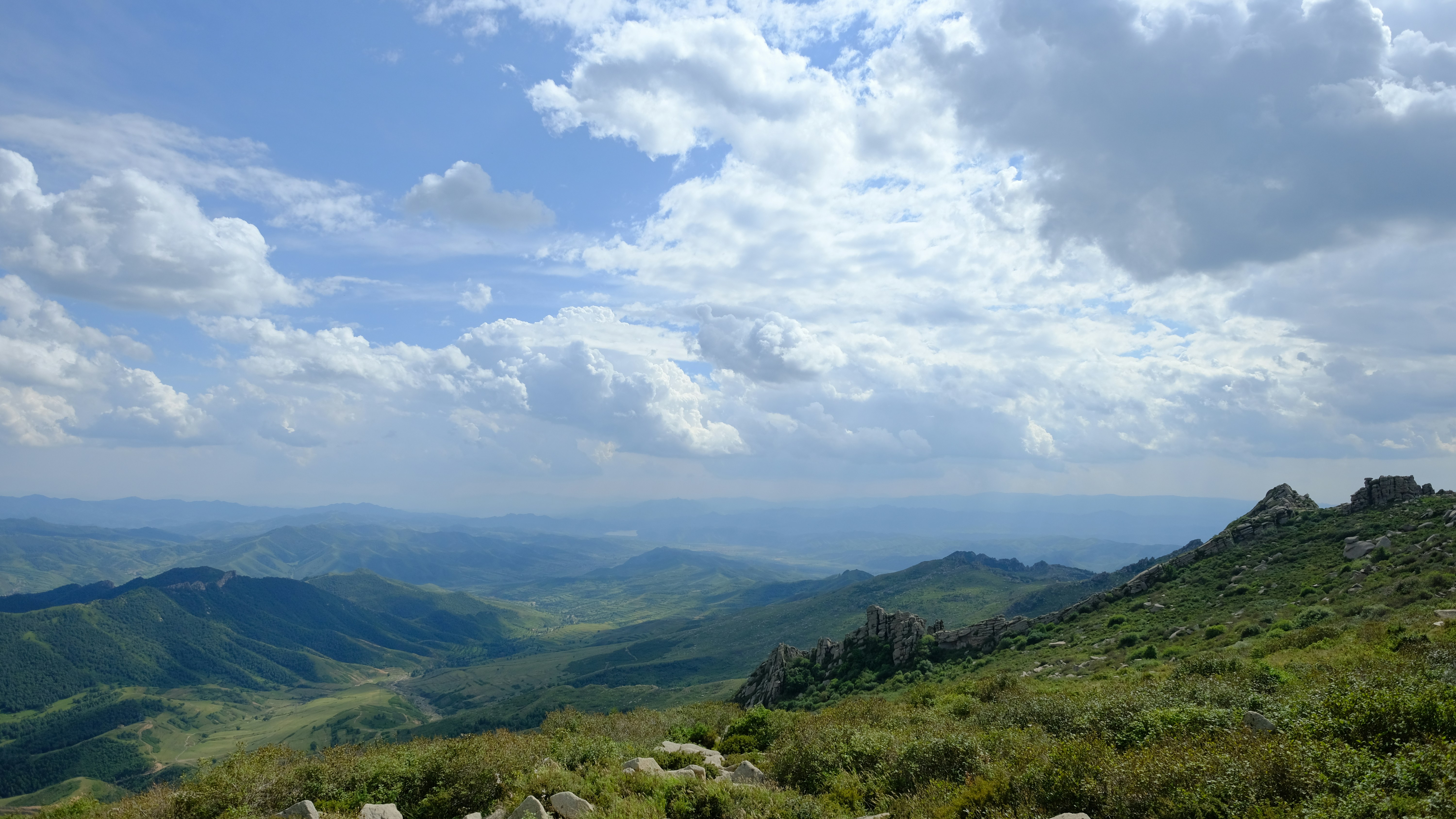 Rolling Valleys Under a Dreamy Sky
