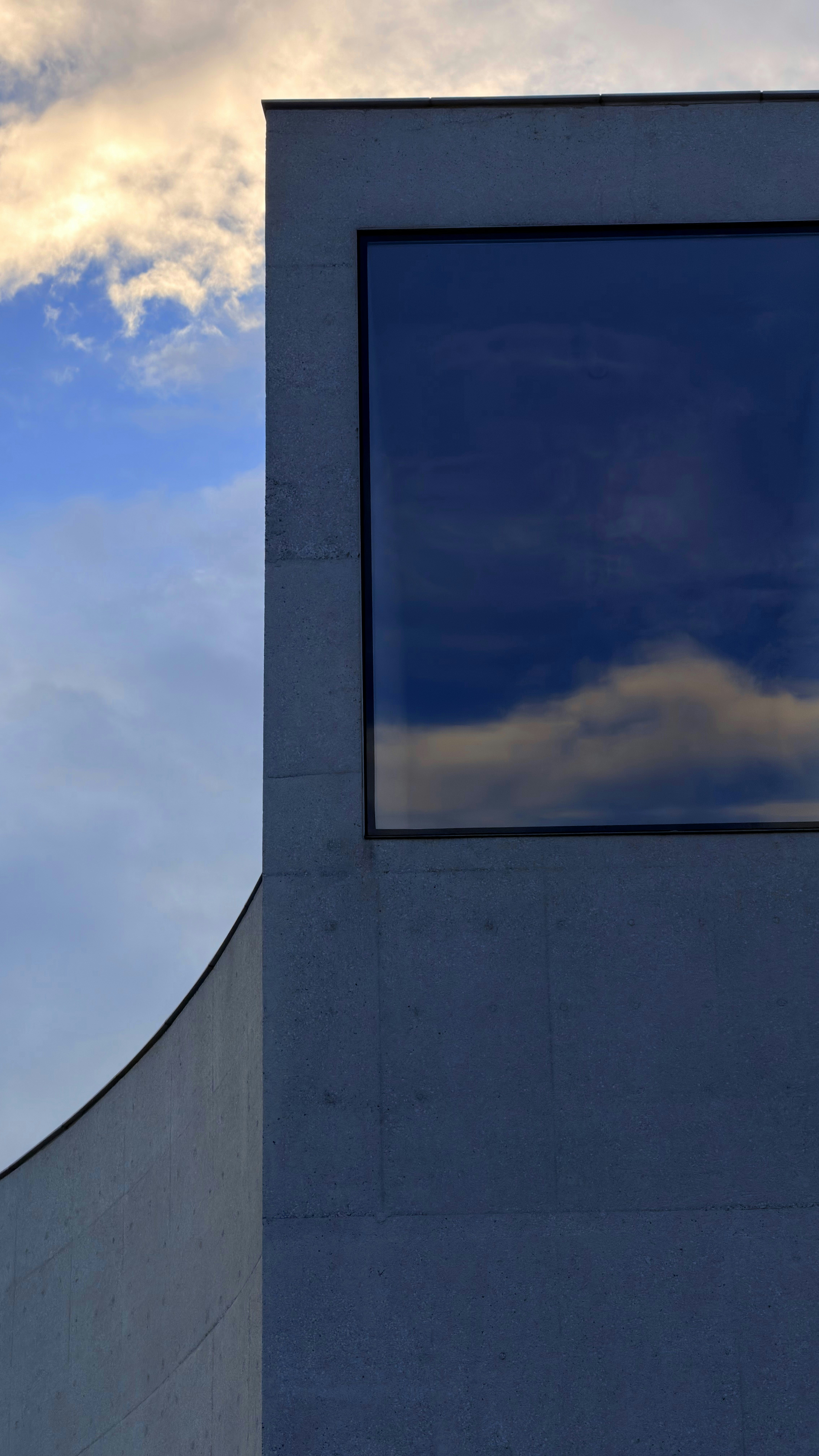 Blue Glass on Concrete Edge