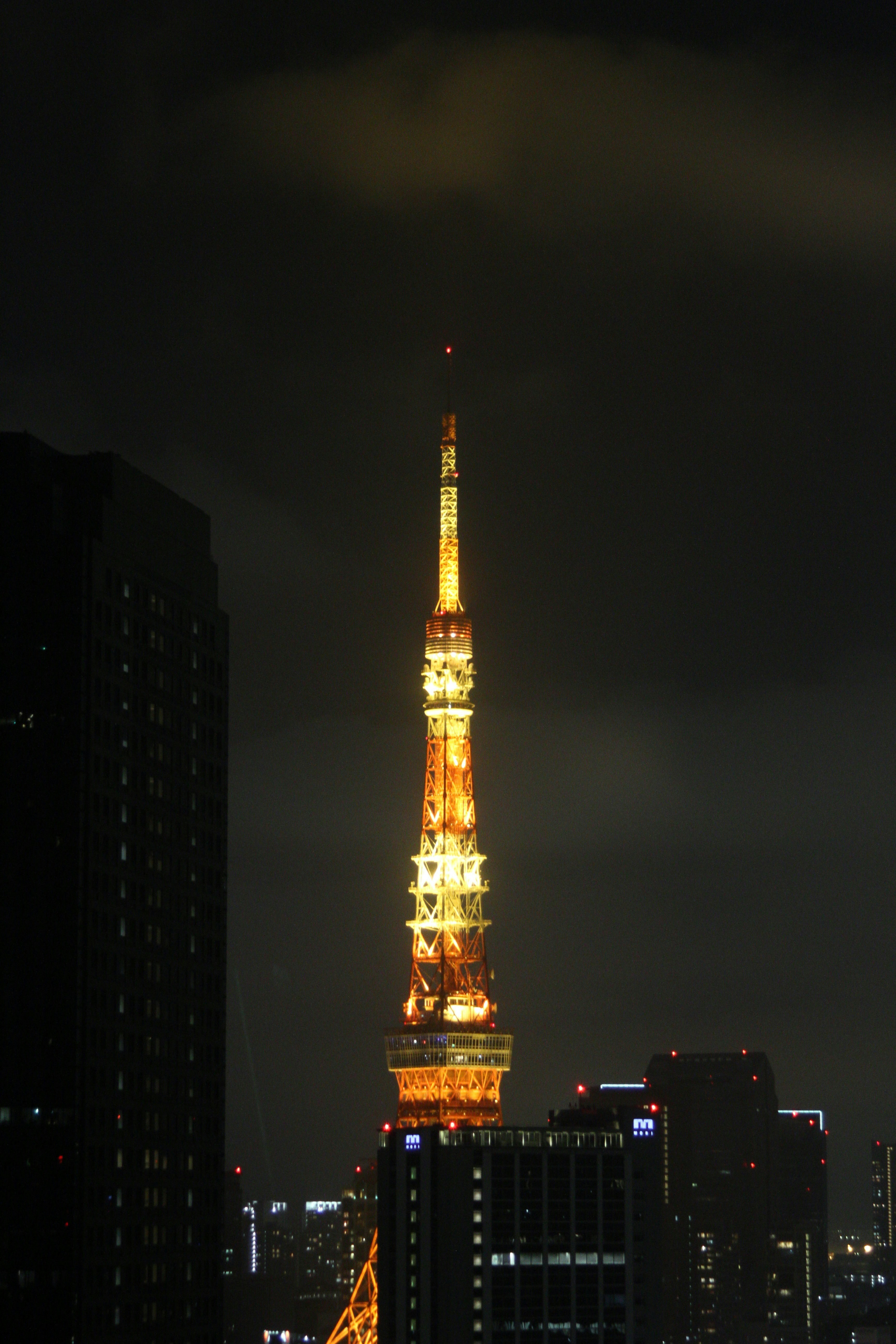 Tokyo Tower at Night: A Glowing Vertical Beacon Above a Quiet City