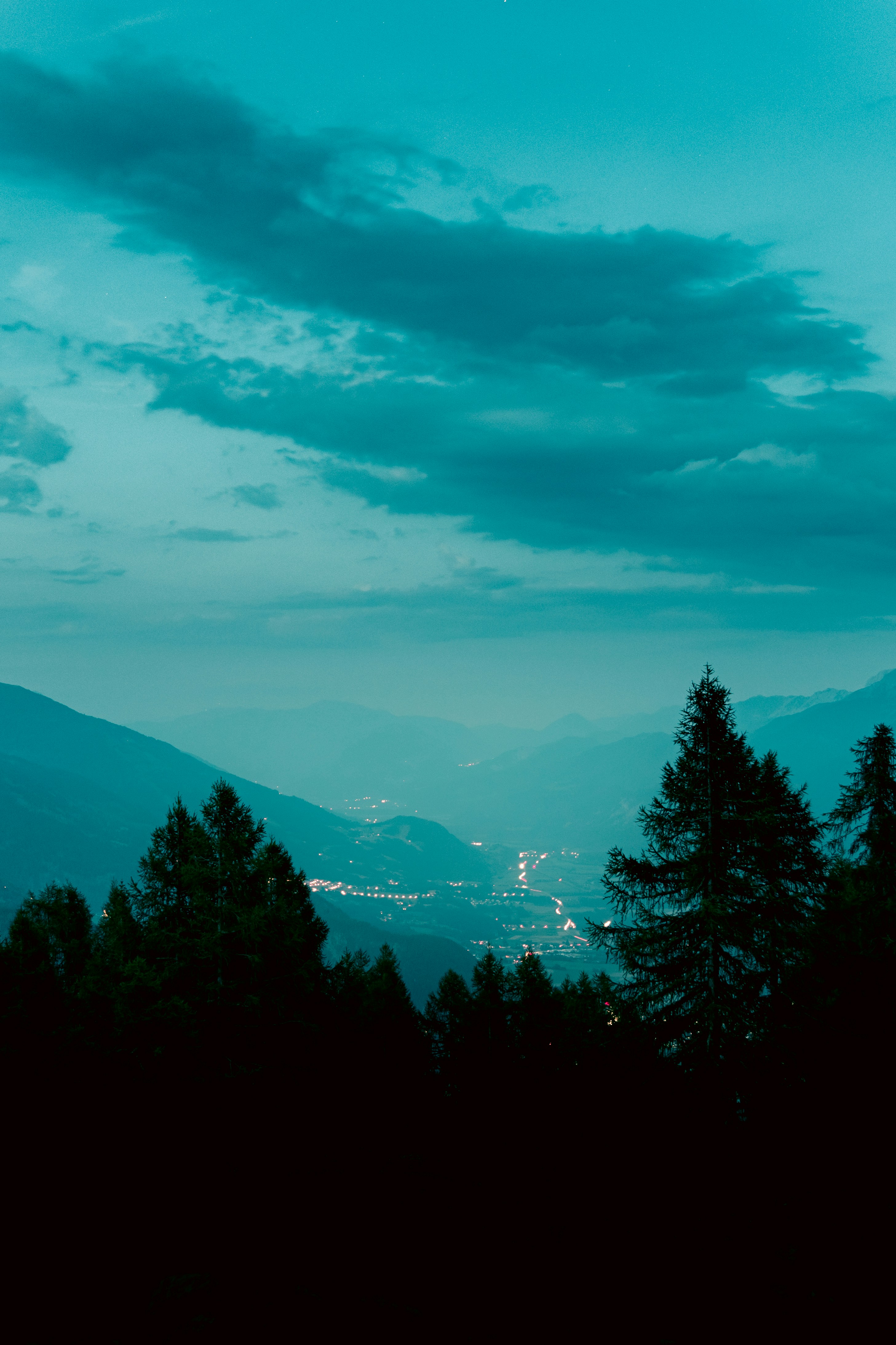 Twilight Terrace: A Valley Veiled in Cyan Silence