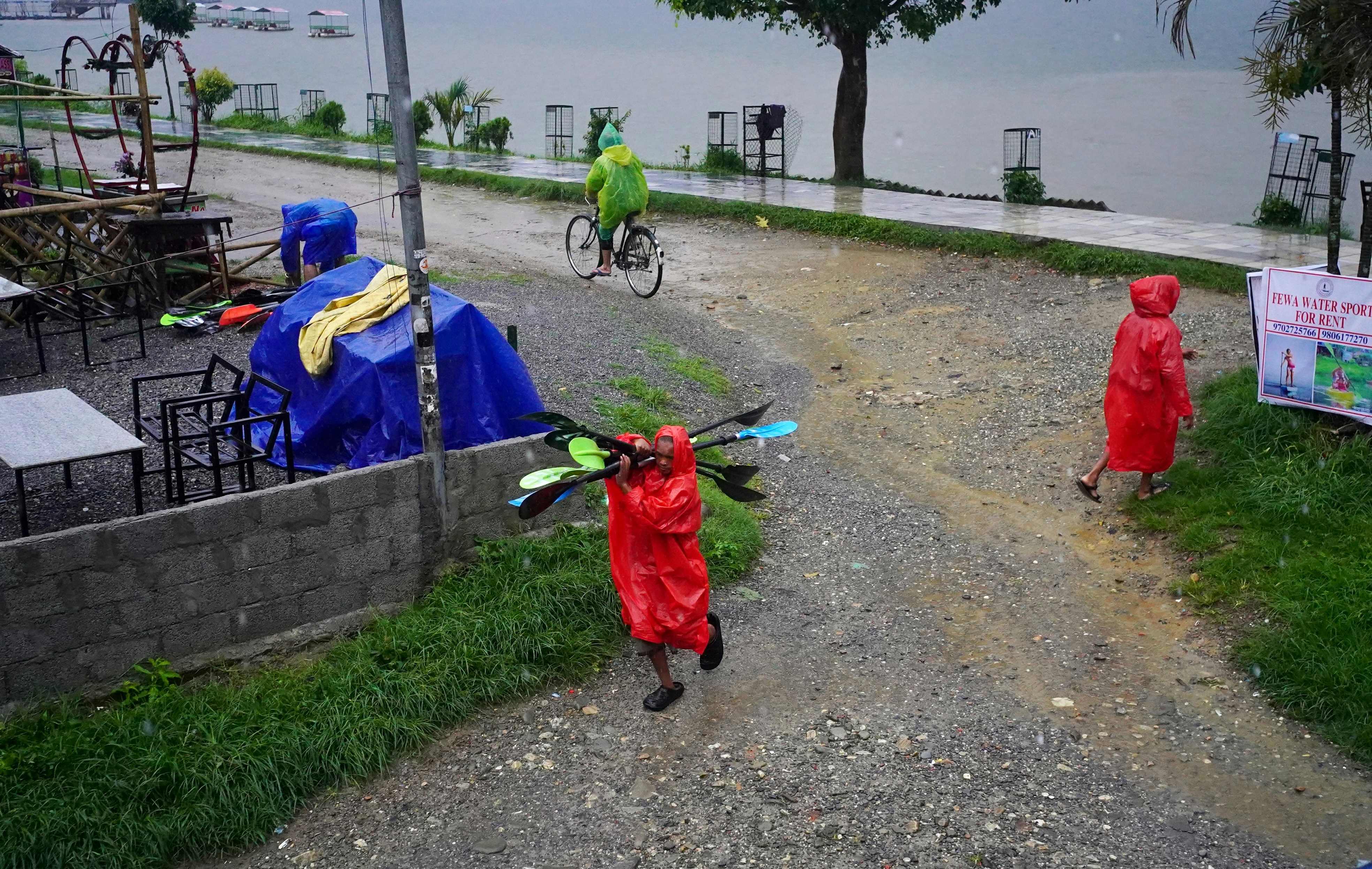 Colorful Rain Gear in a Waterfront Walkway Sketch