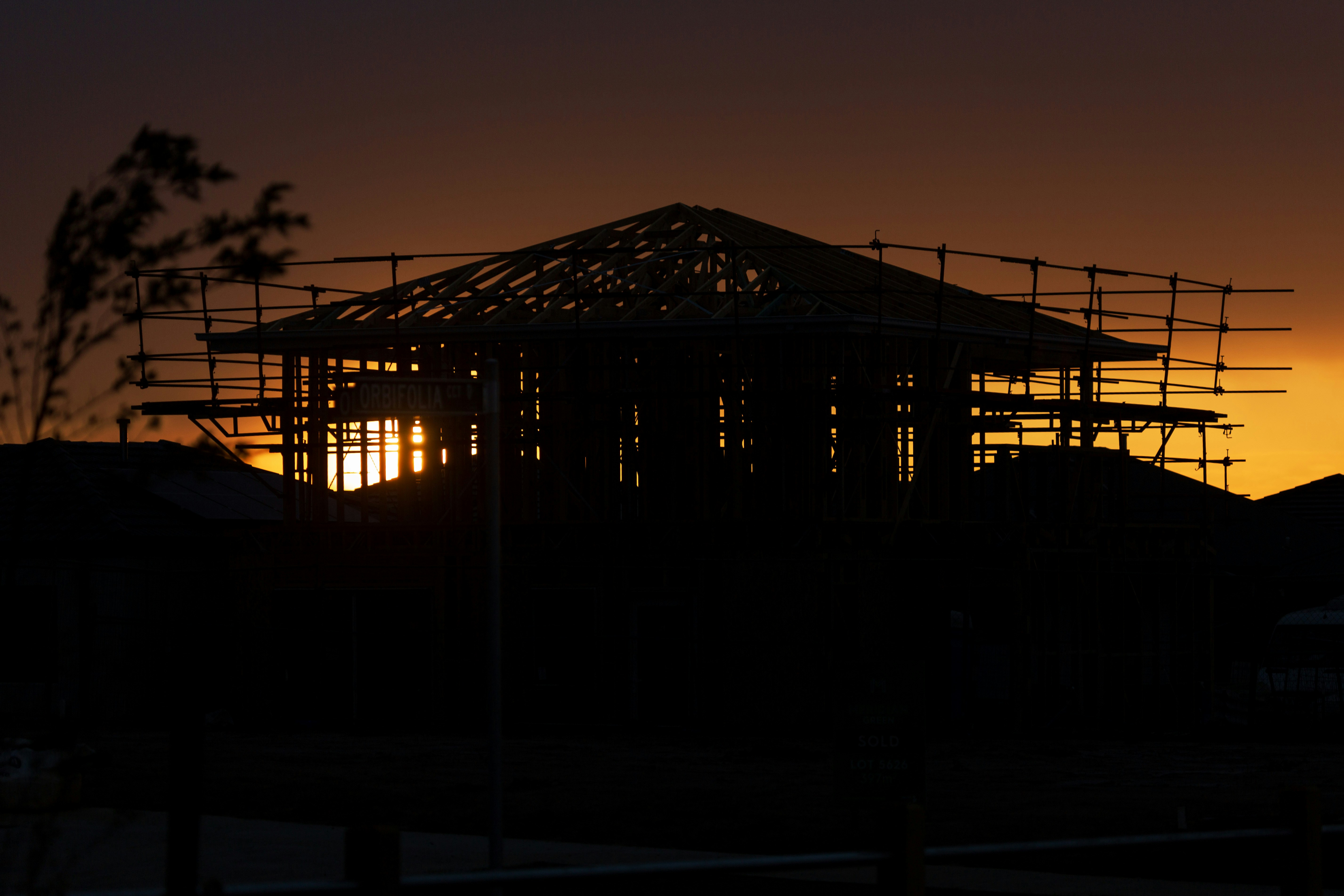 Sunrise on site and tradies at work.