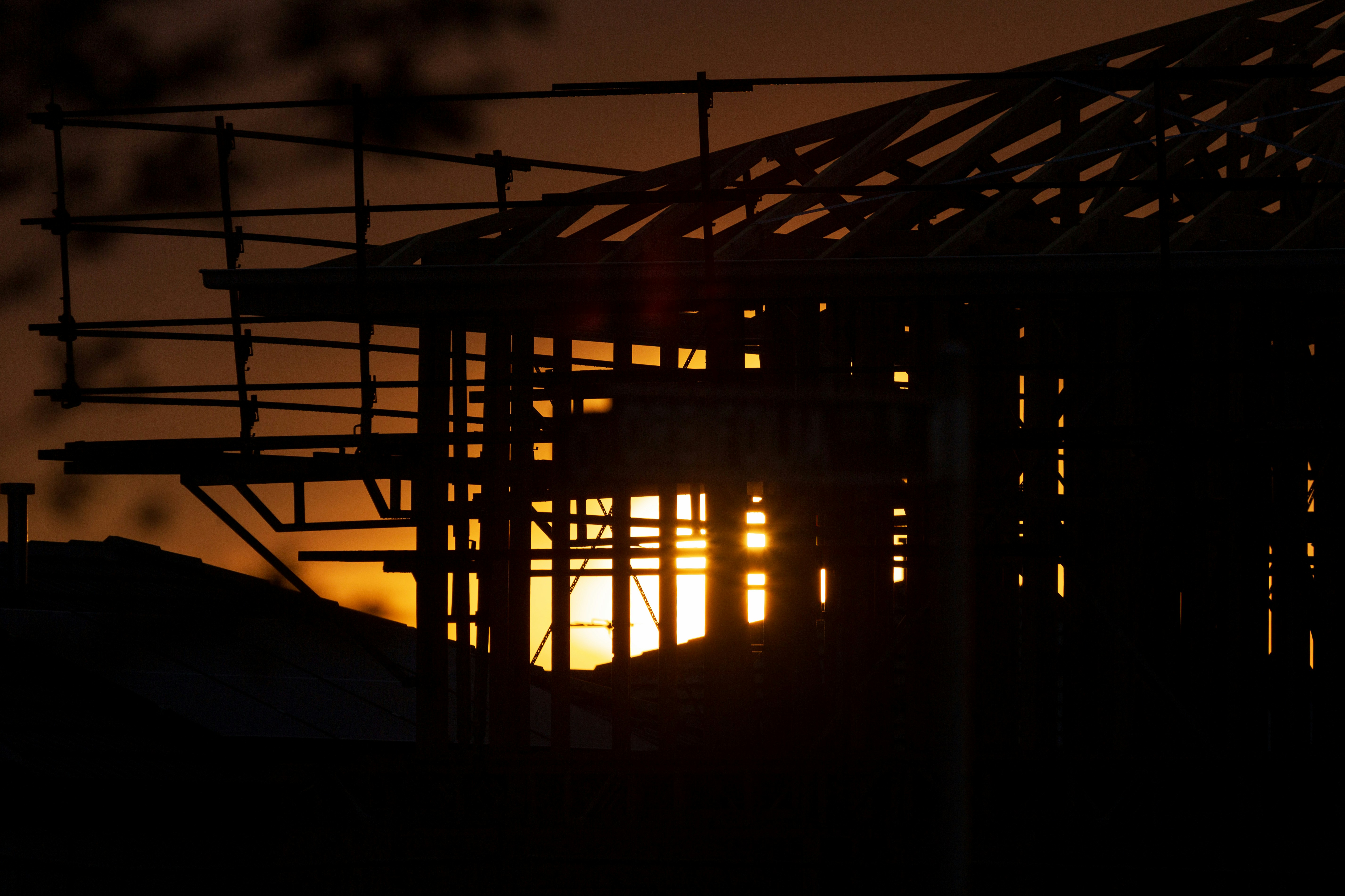 Sunrise on site and tradies at work.
