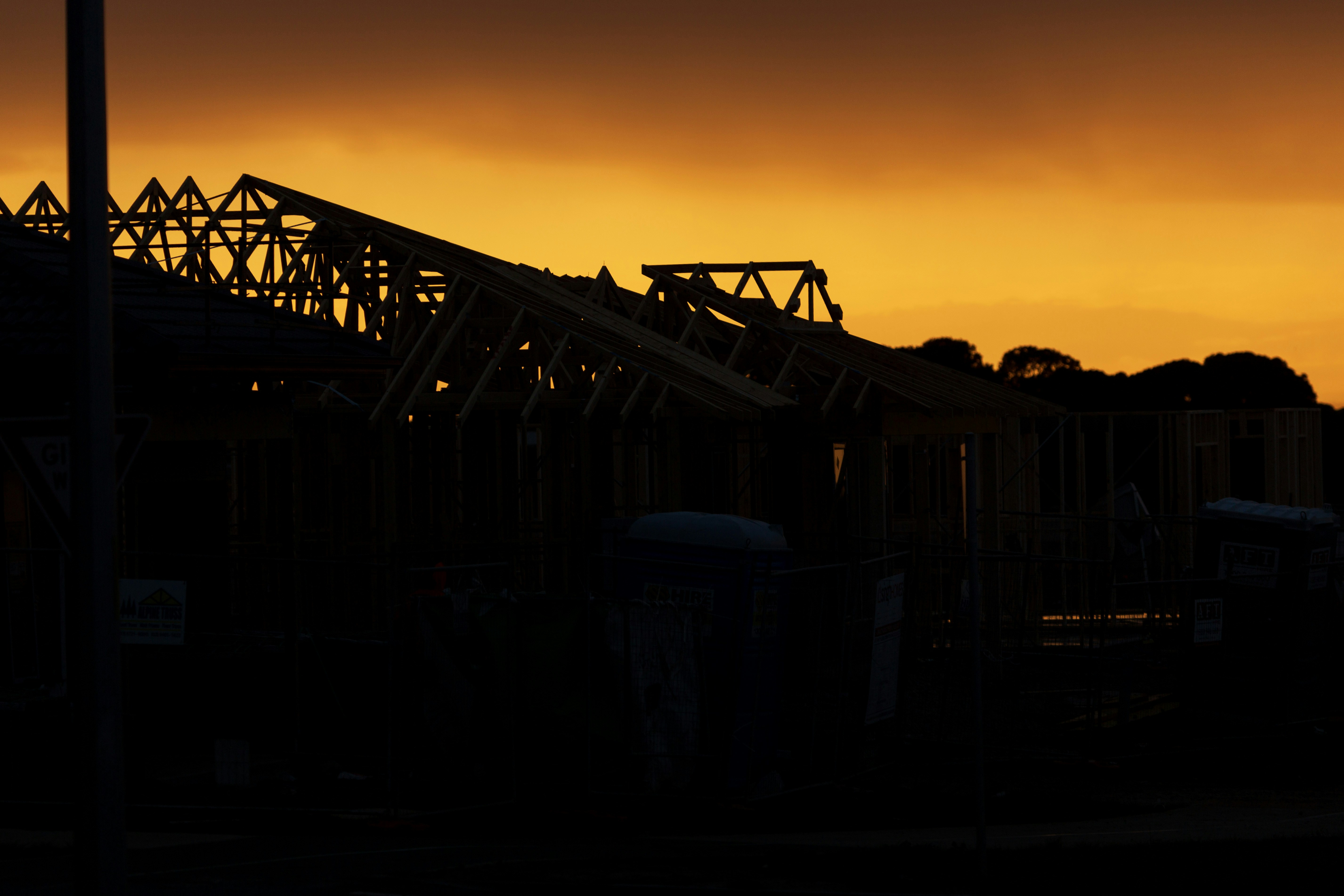 Sunrise on site and tradies at work.