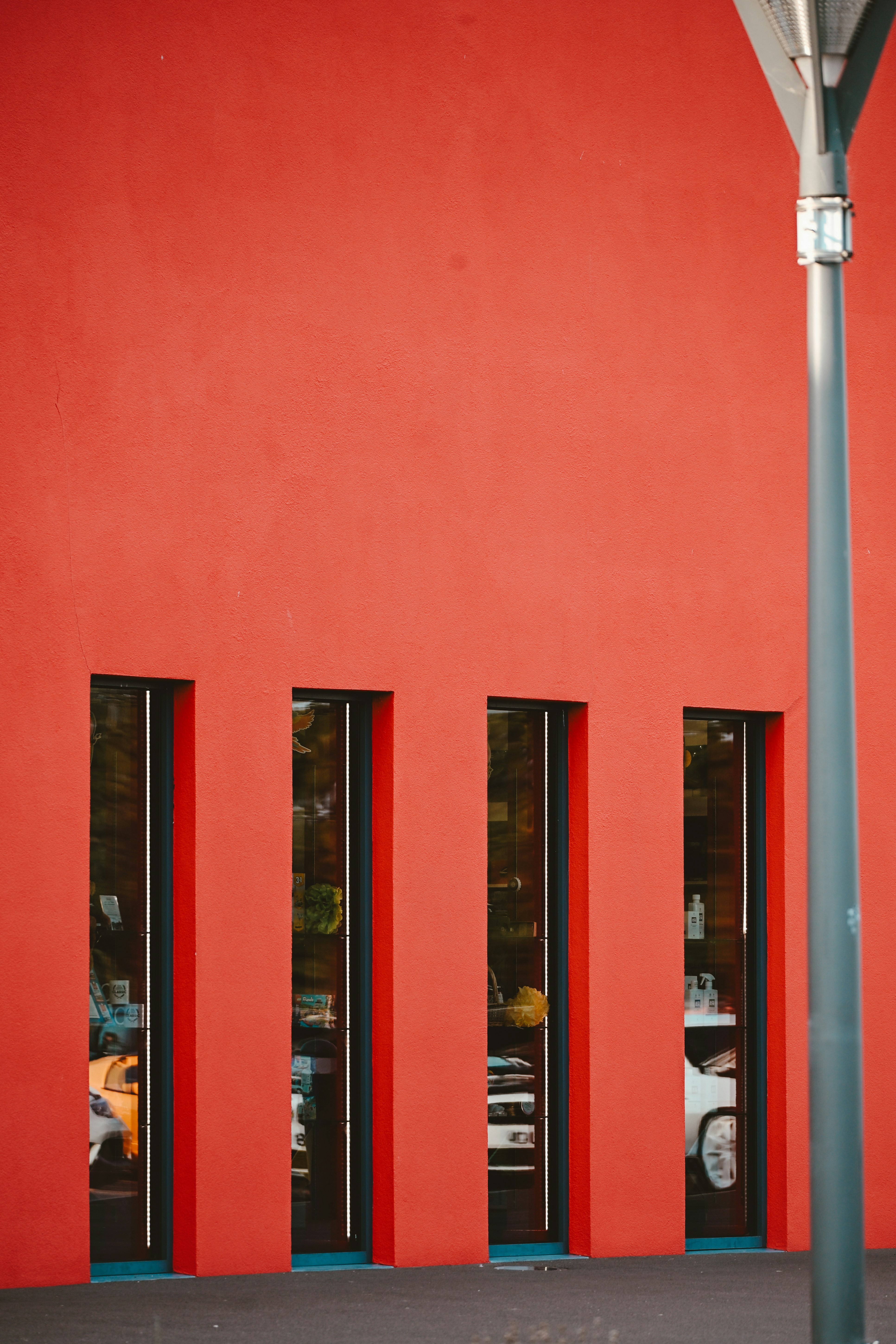 Red Facade with Slender Window Spikes
