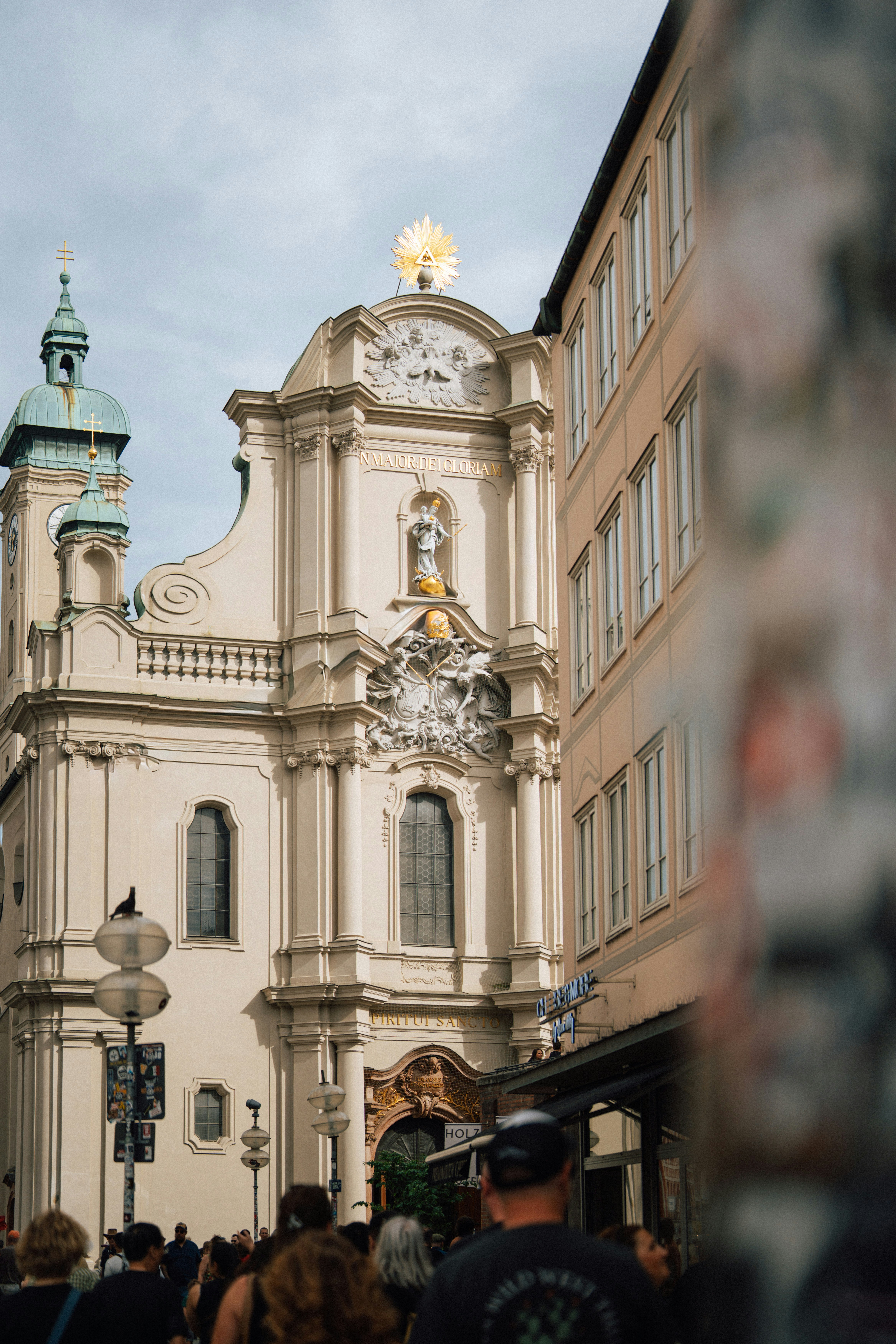 Sunlit Baroque Facade Amid a Quiet Street