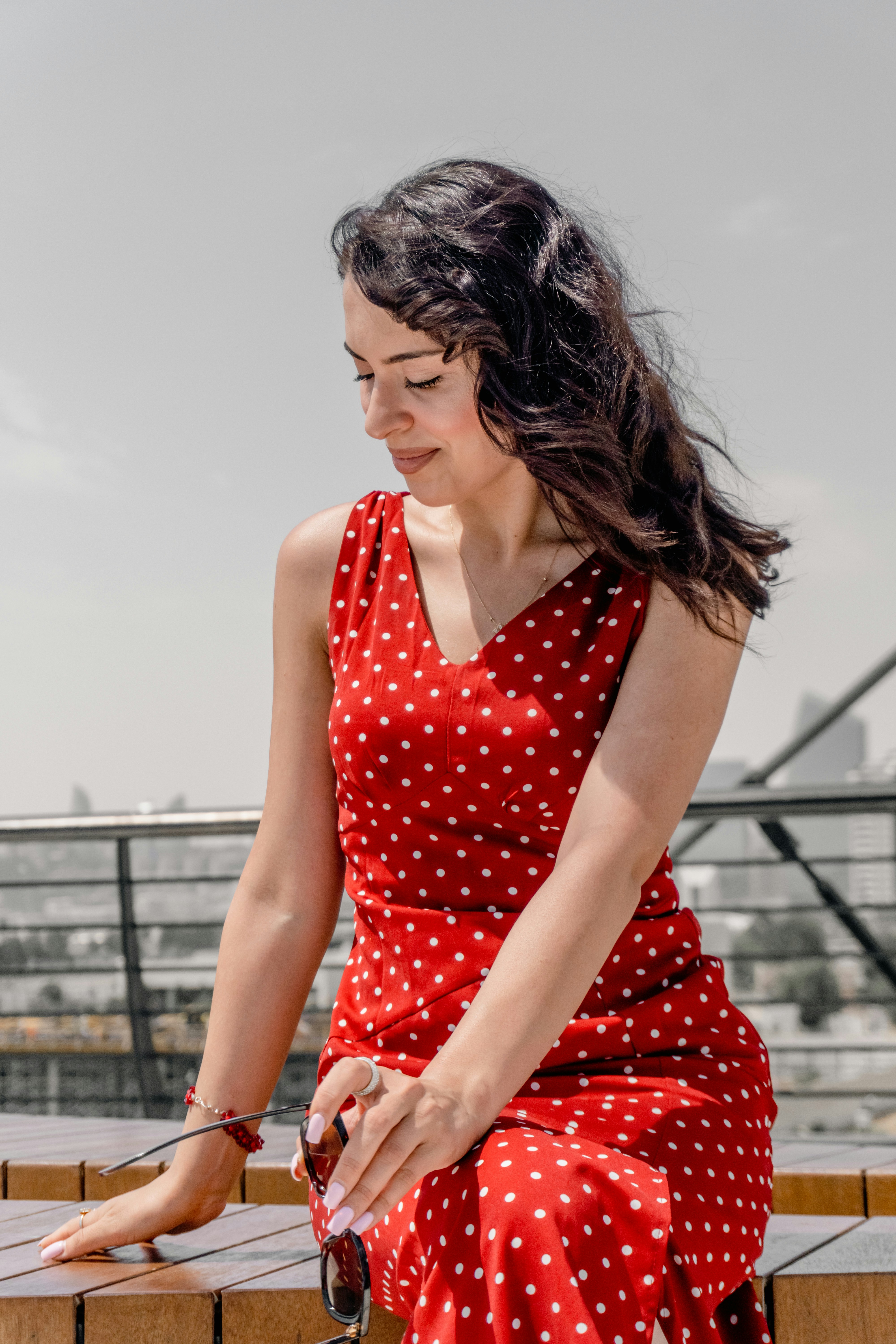 Red Polka Dot Dress on a Sunny Terrace
