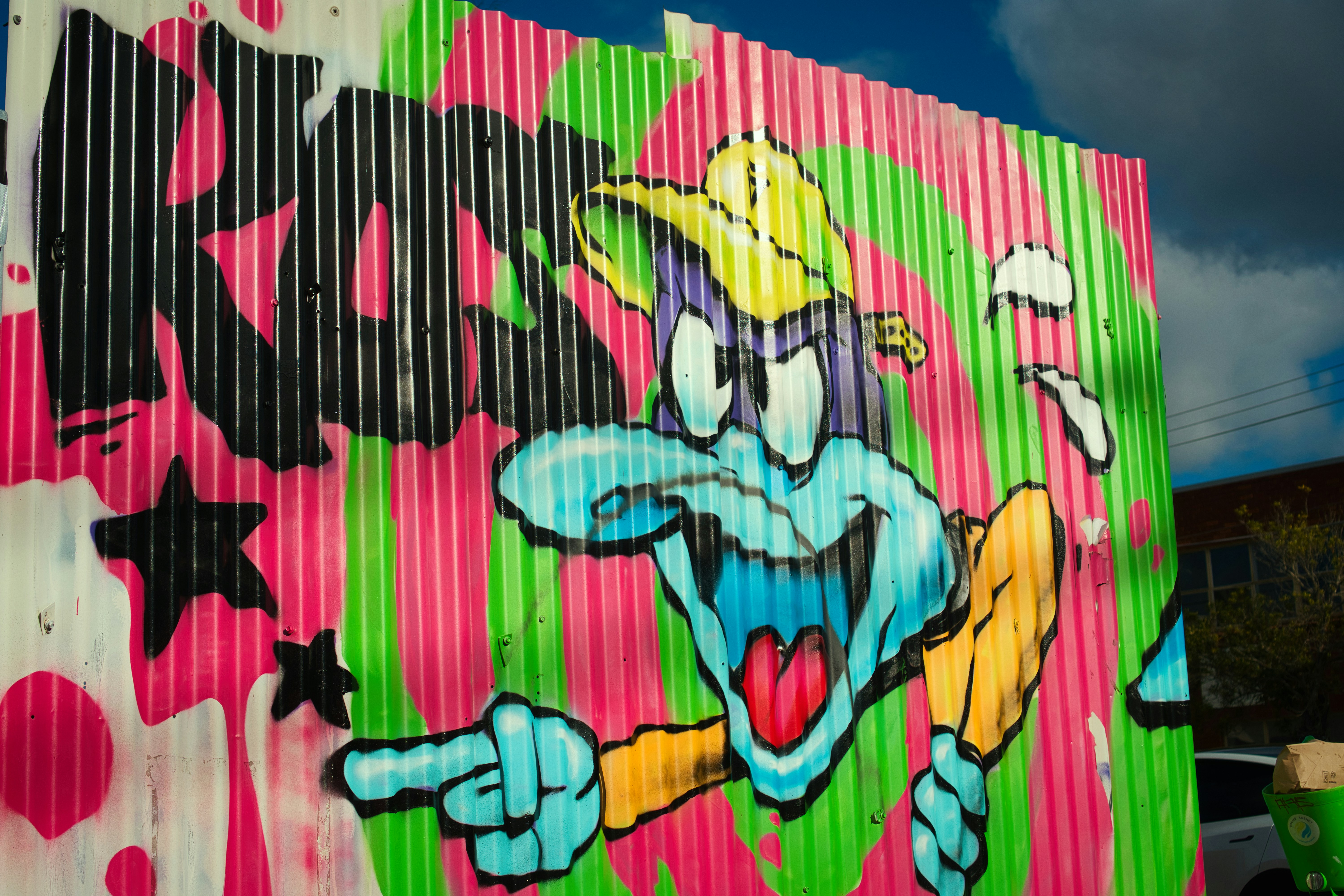 Chromatic Dragon of the Wall: A Neon Clowning Cartoon