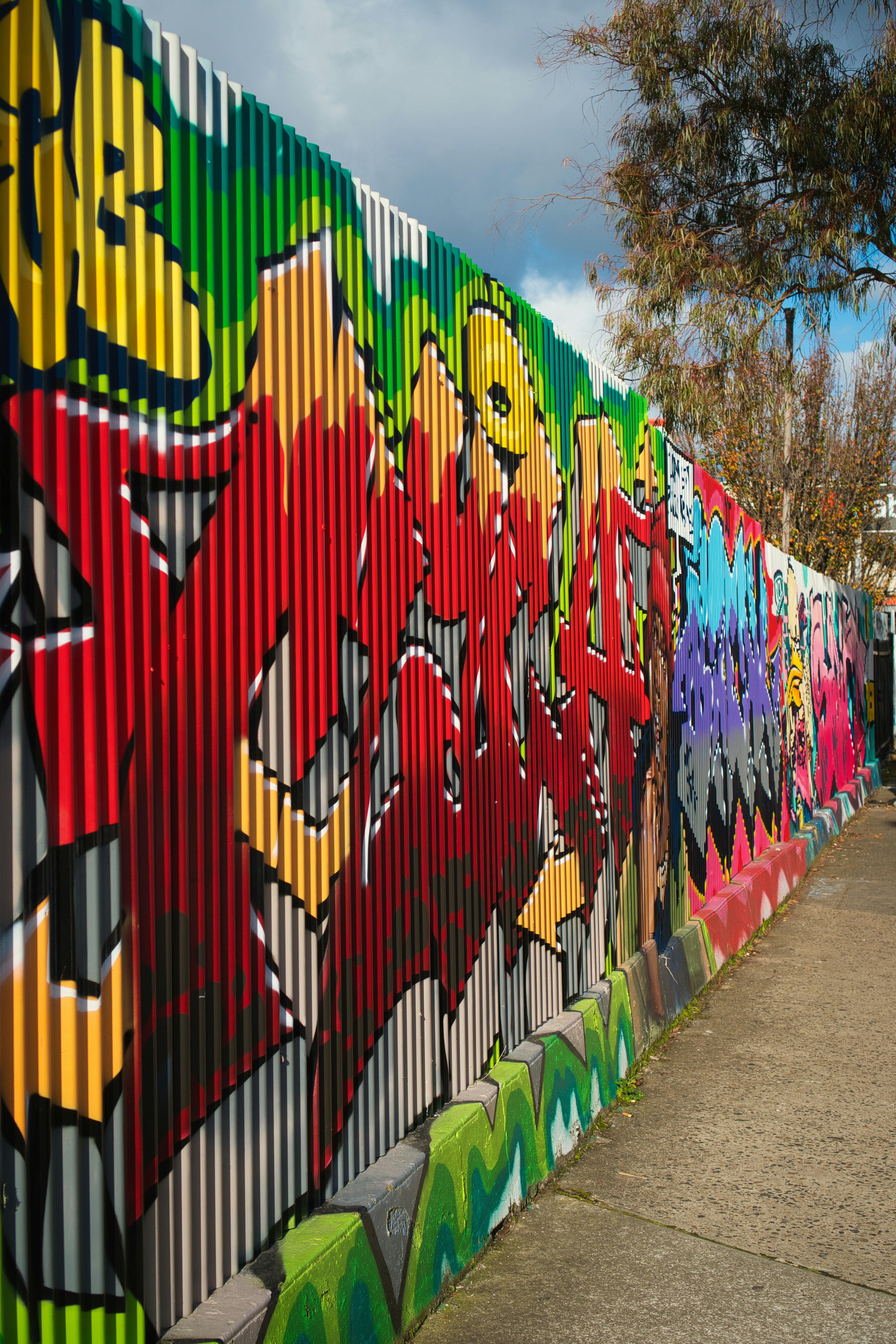 Urban Palette: A Long Corridor of Colorful Graffiti
