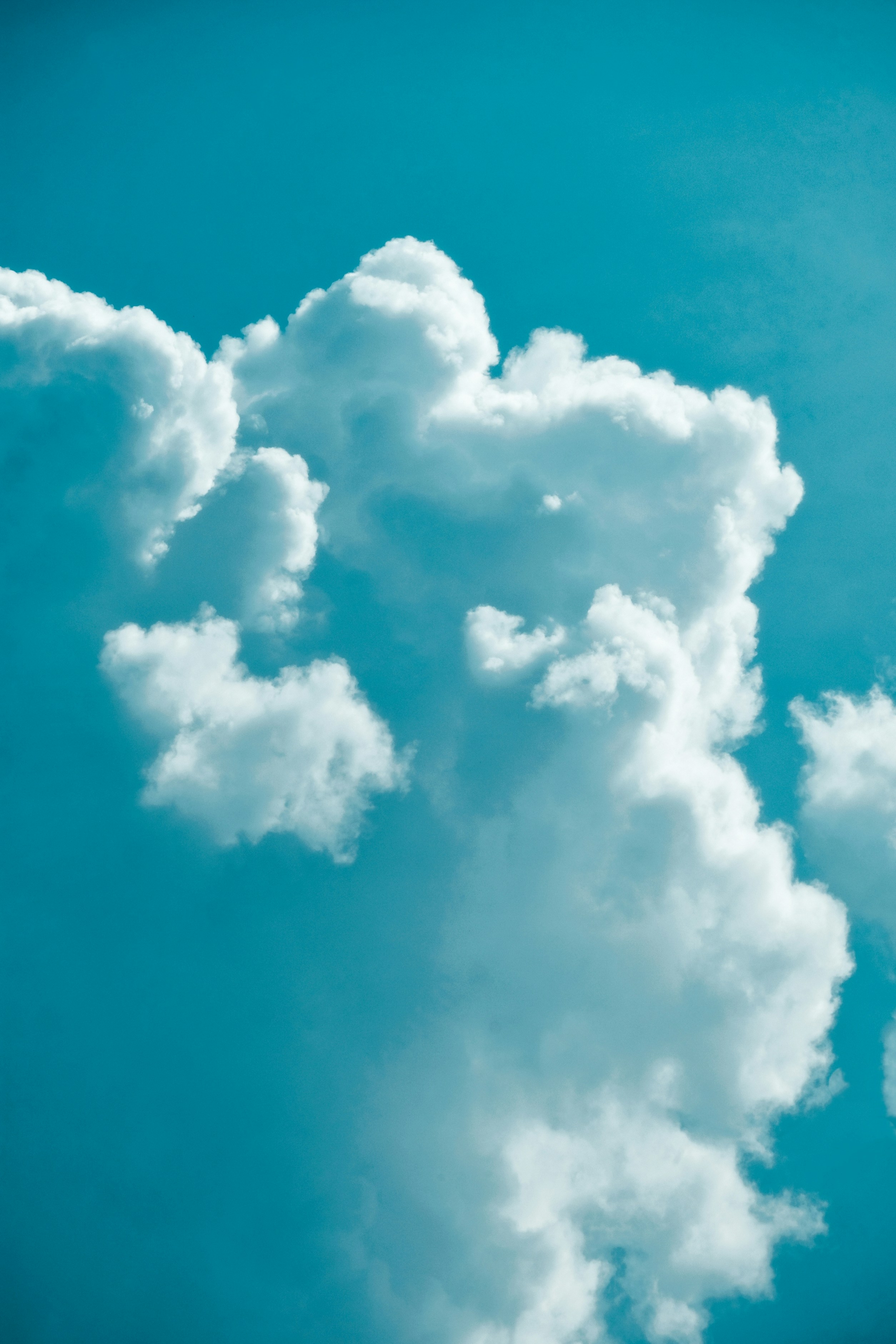 Azure Sky and Cloud Towers