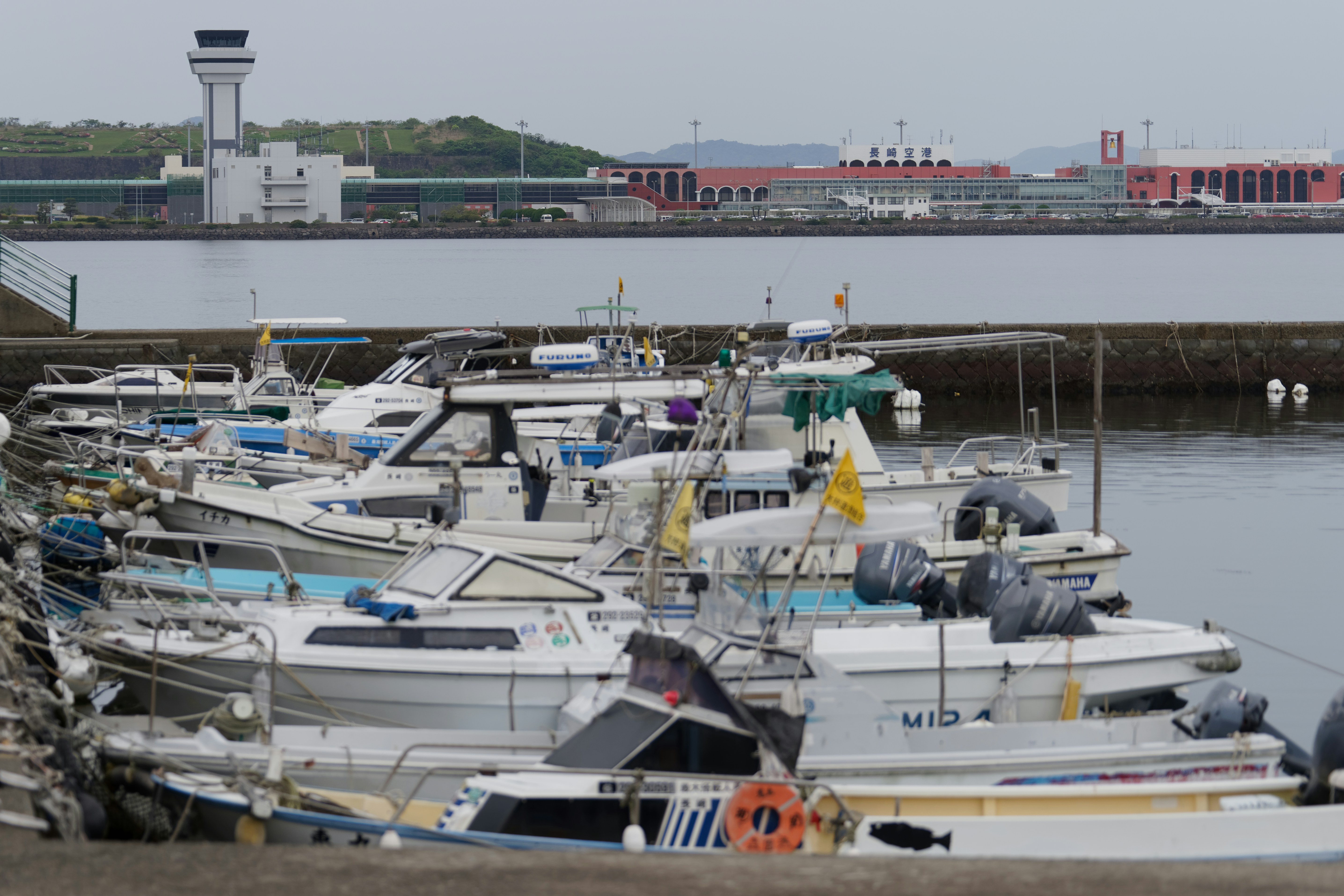 Hull Parade: Boats Moored Along the Calm Marina Front