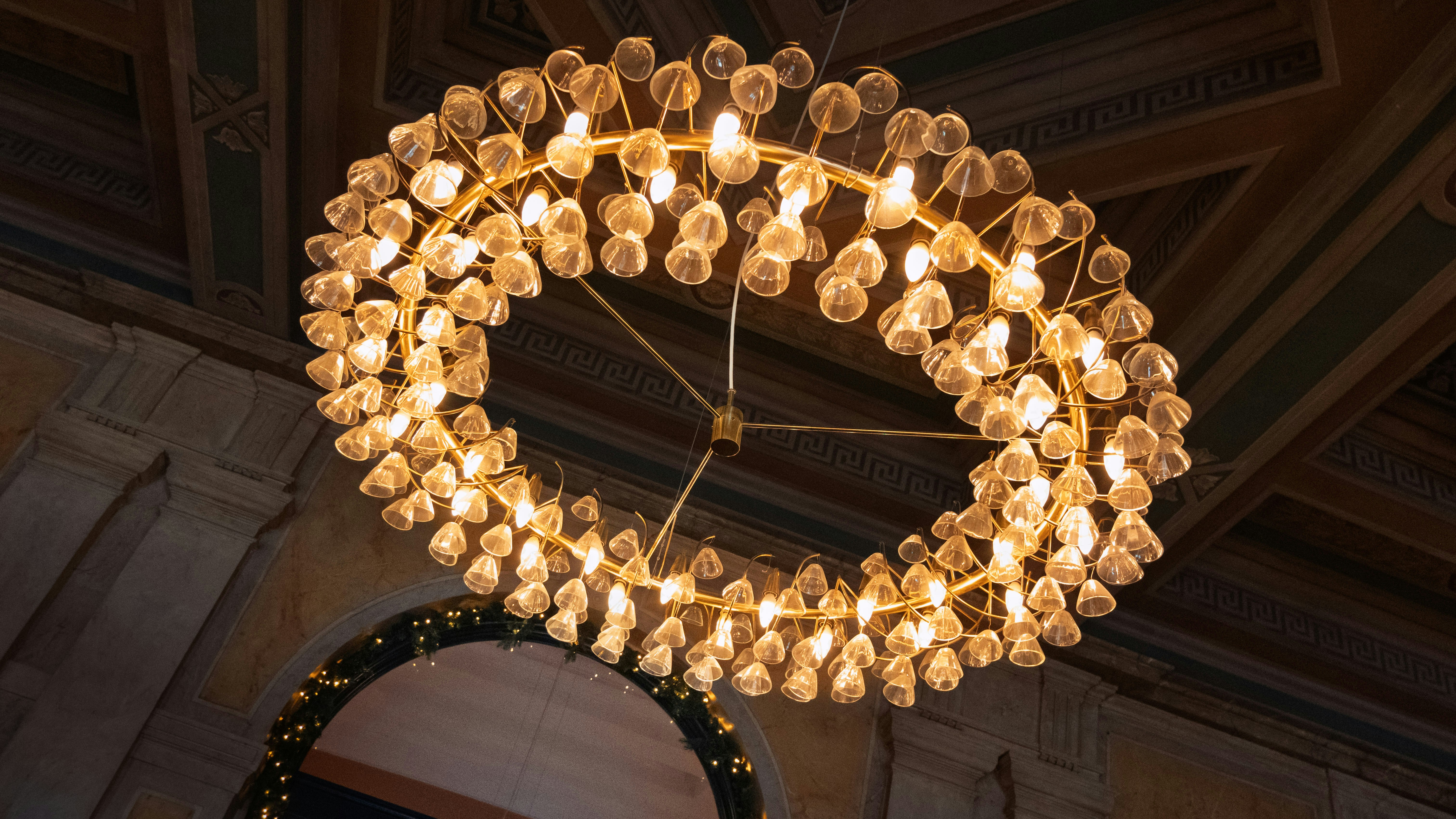 Circular Lantern: A Majestic Crystal Ring Illuminates a Historic Ceiling