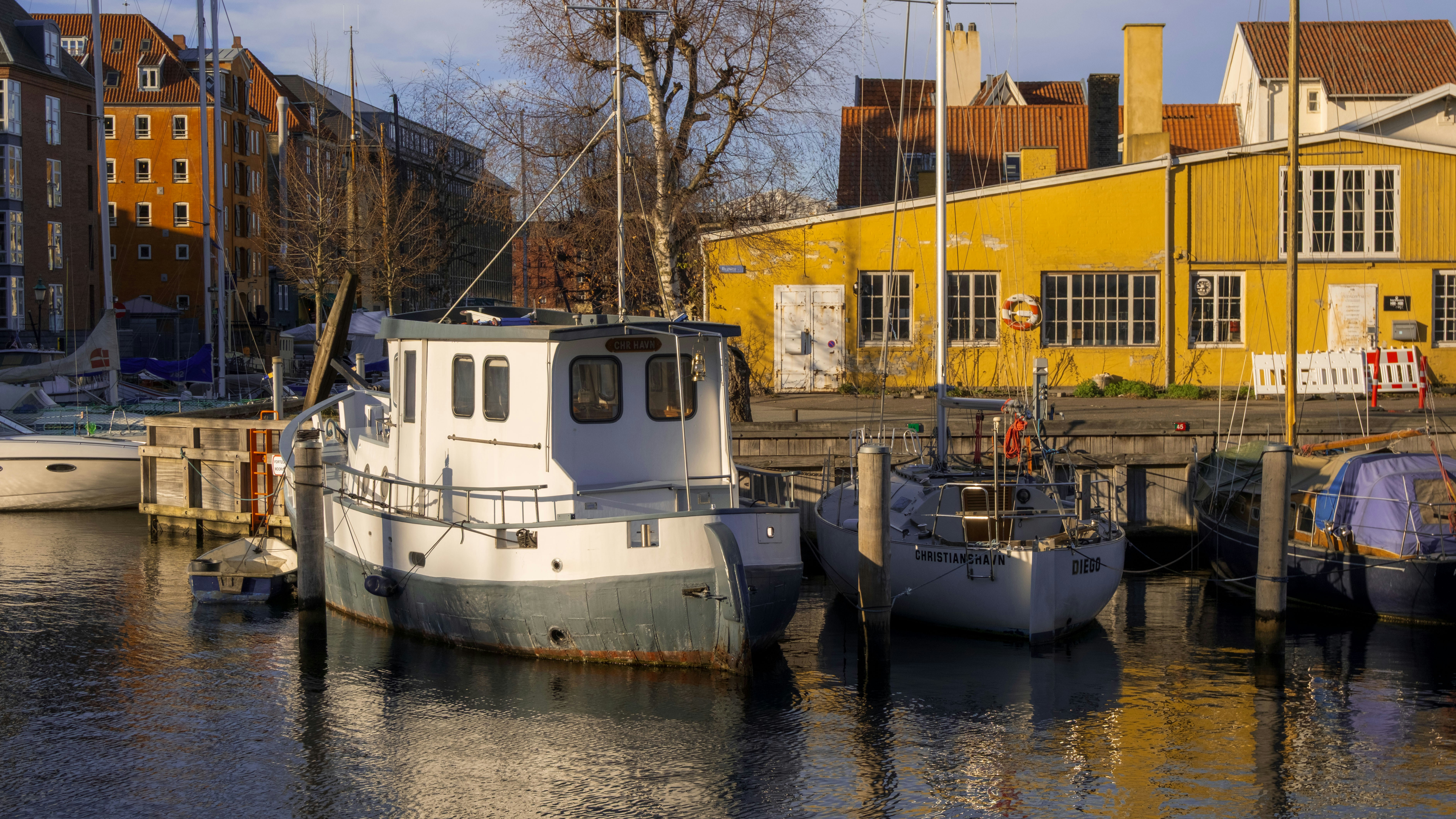Harbor in Morning Light: Boats and Bold Yellow Factory
