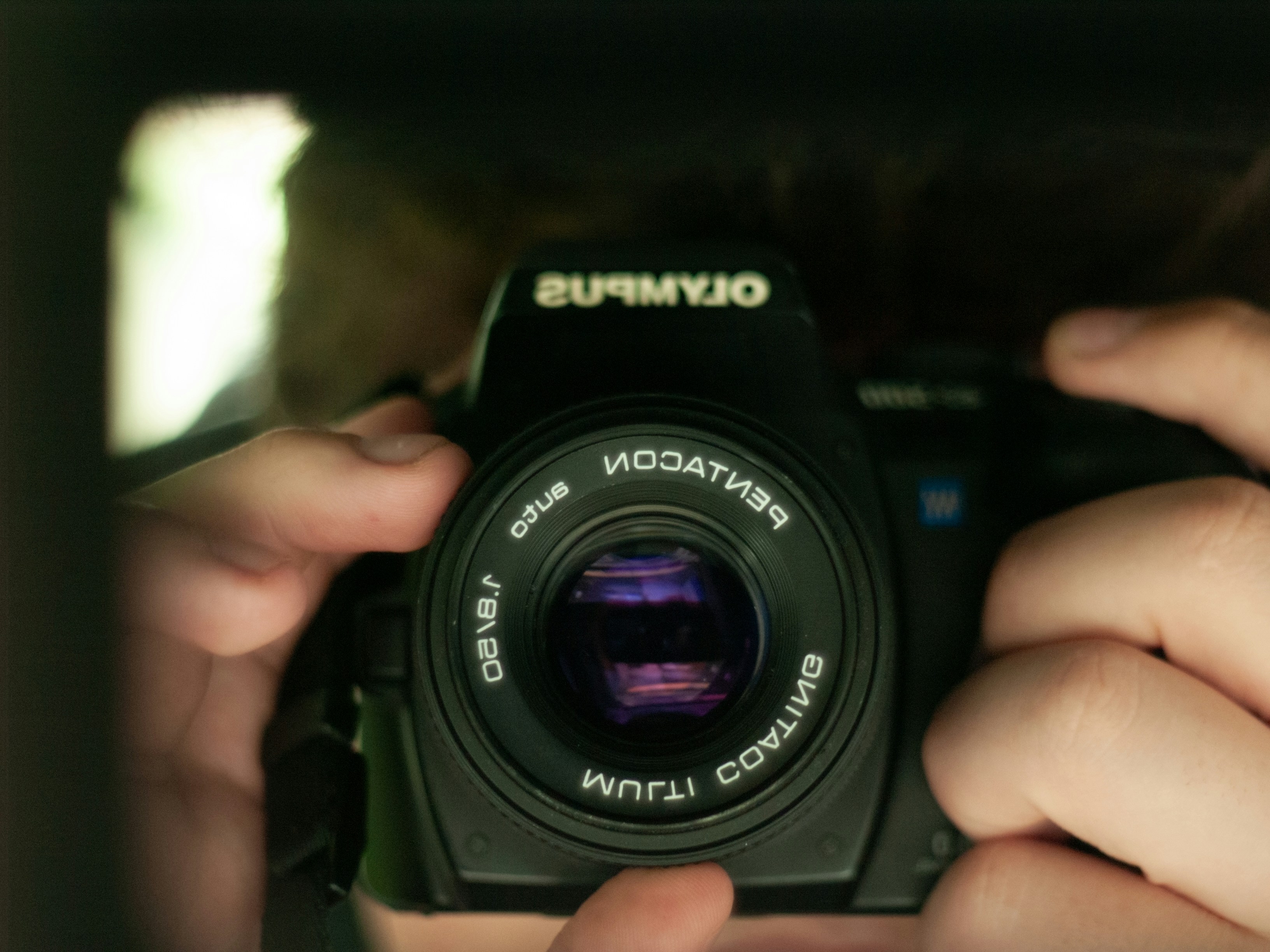Through the Lens: A Mirror Self-Portrait of Focus and Focus Ring