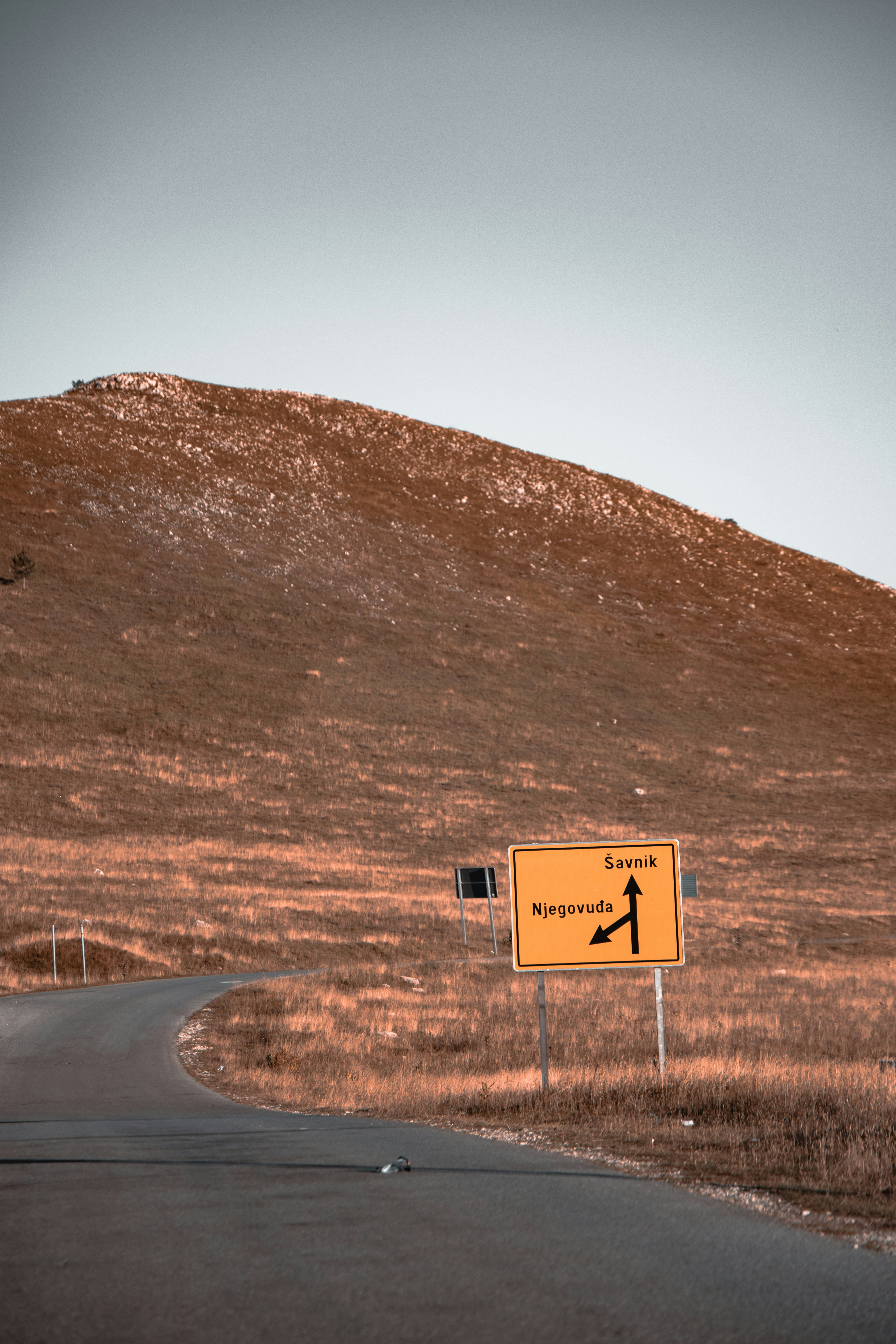 Winding Road Toward a Distant Summit