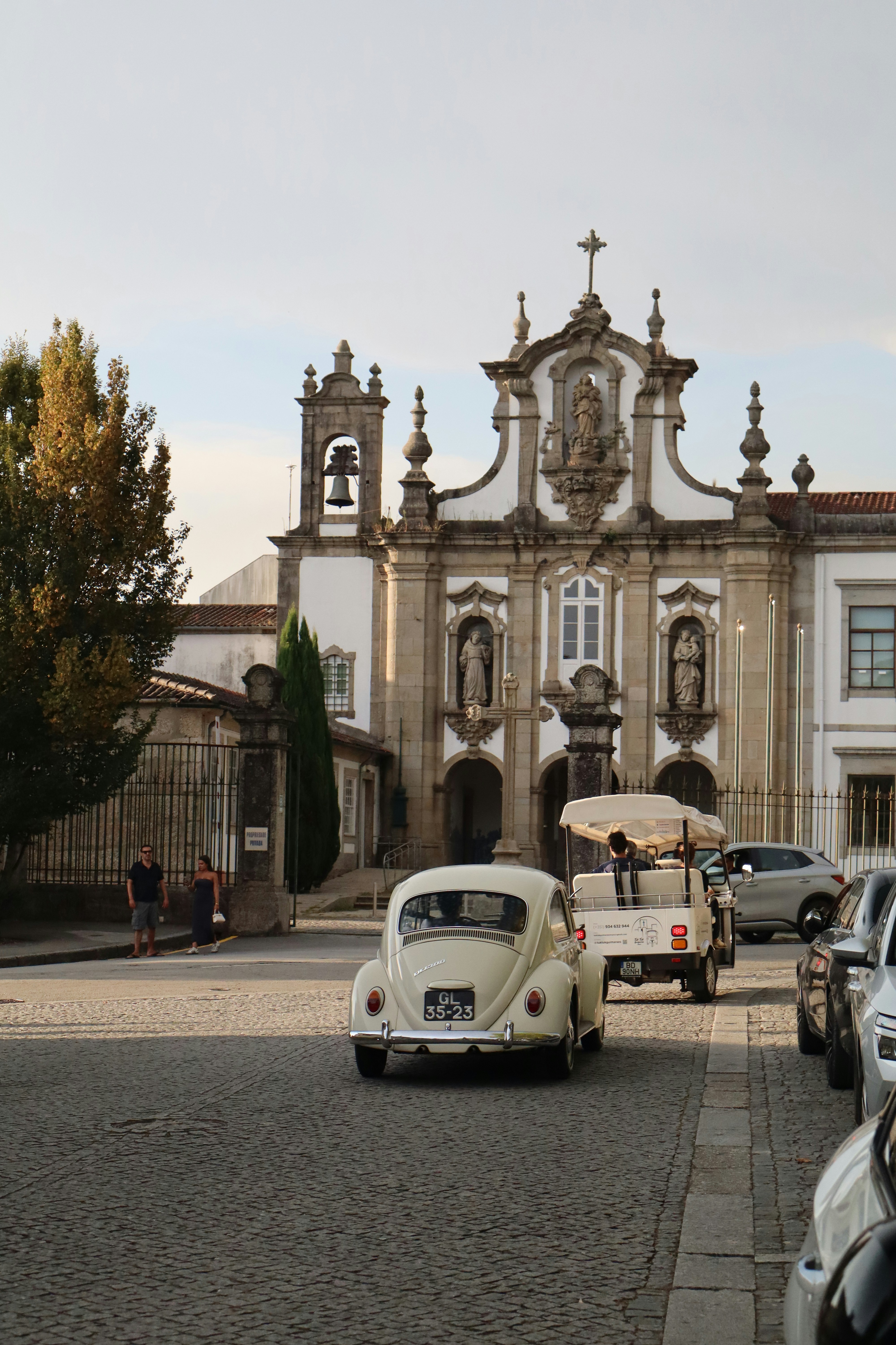 Passing Through a Baroque Campus Morning