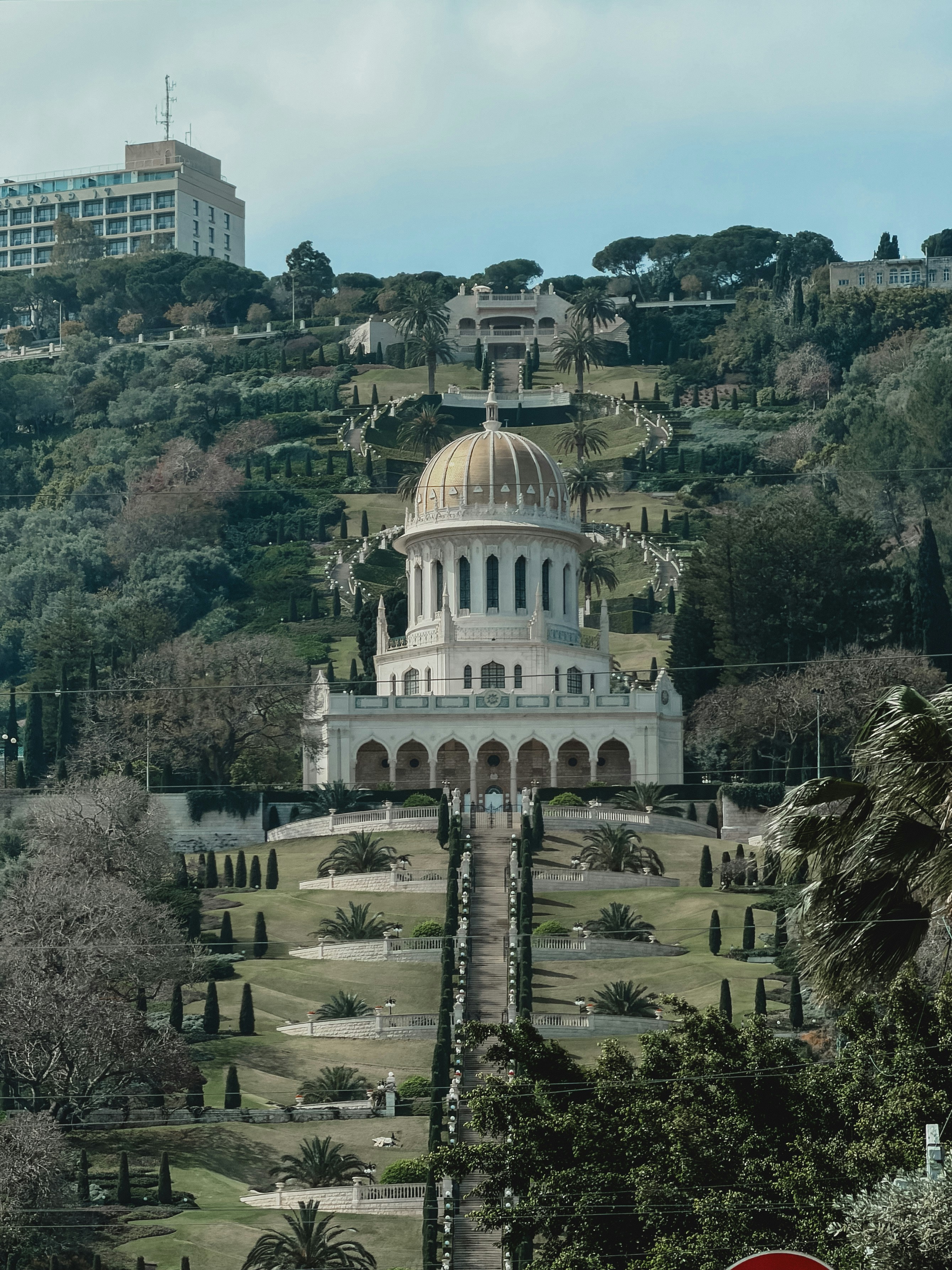 Tiered Serenity: The Basilica Crowned by Golden Dome atop a Terraced Garden