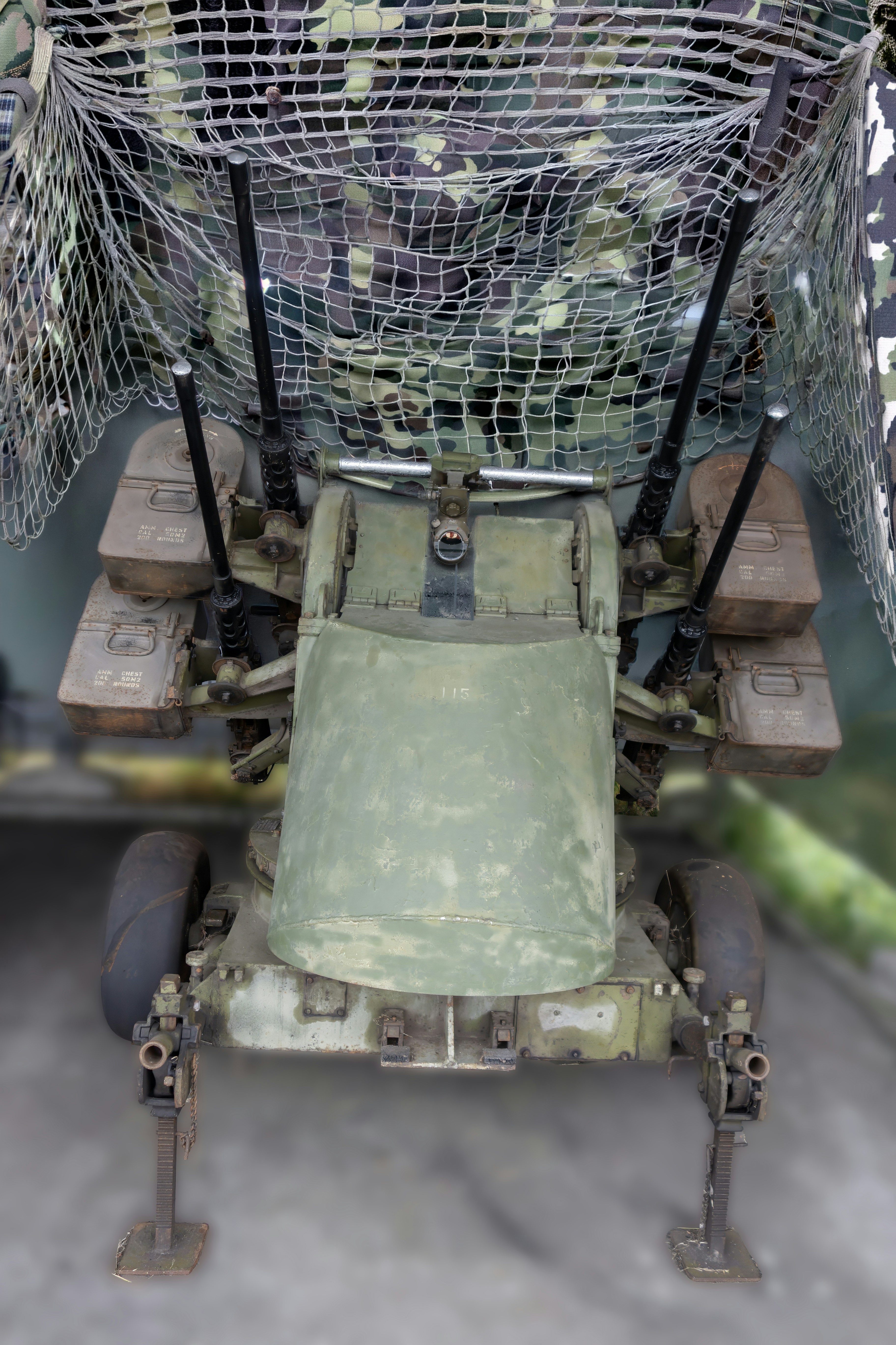 Aerial View of an Old Military Tractor Secured Under Netting