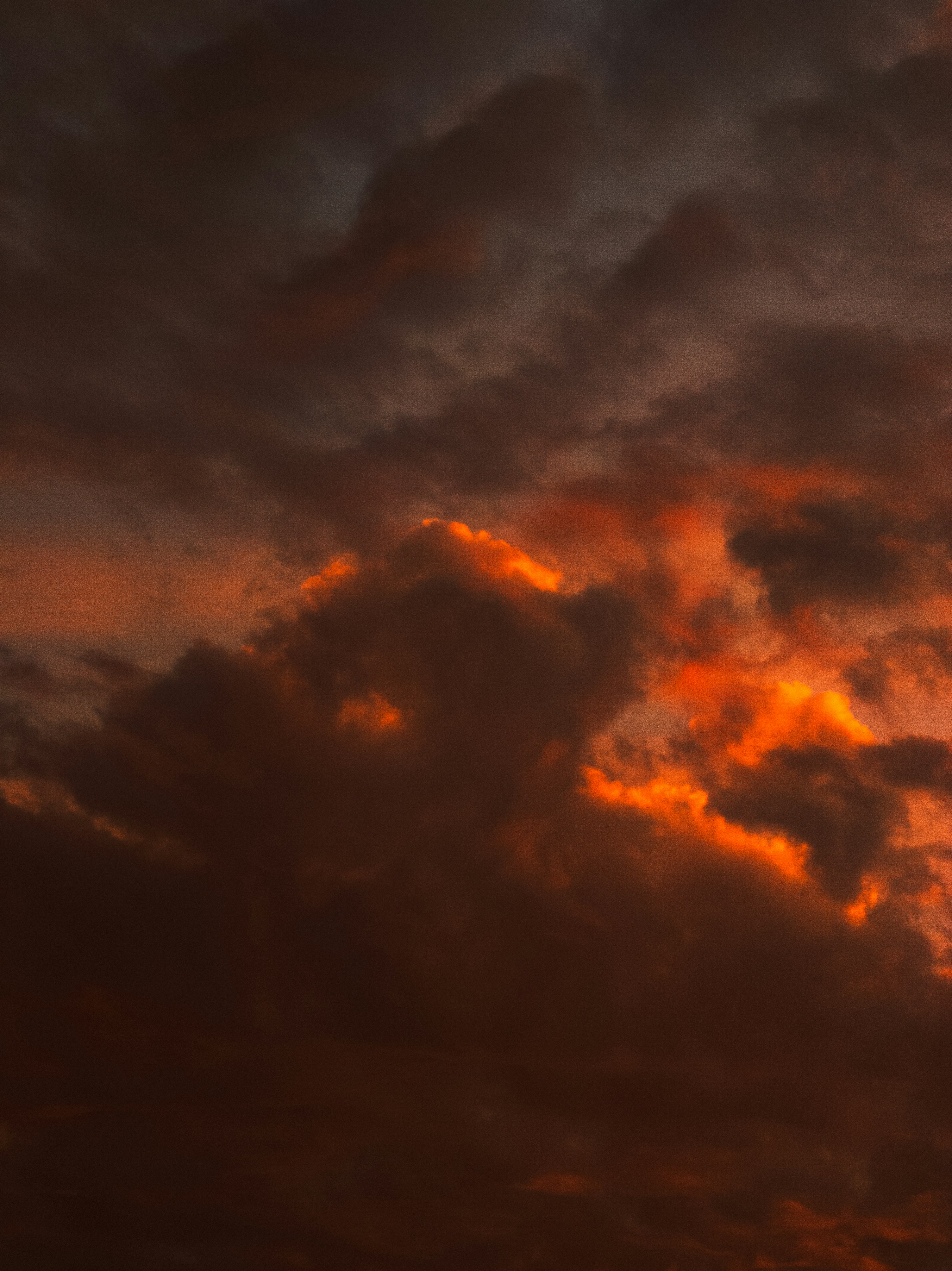 Embers in the Tempest: A Fiery Twilight Sky