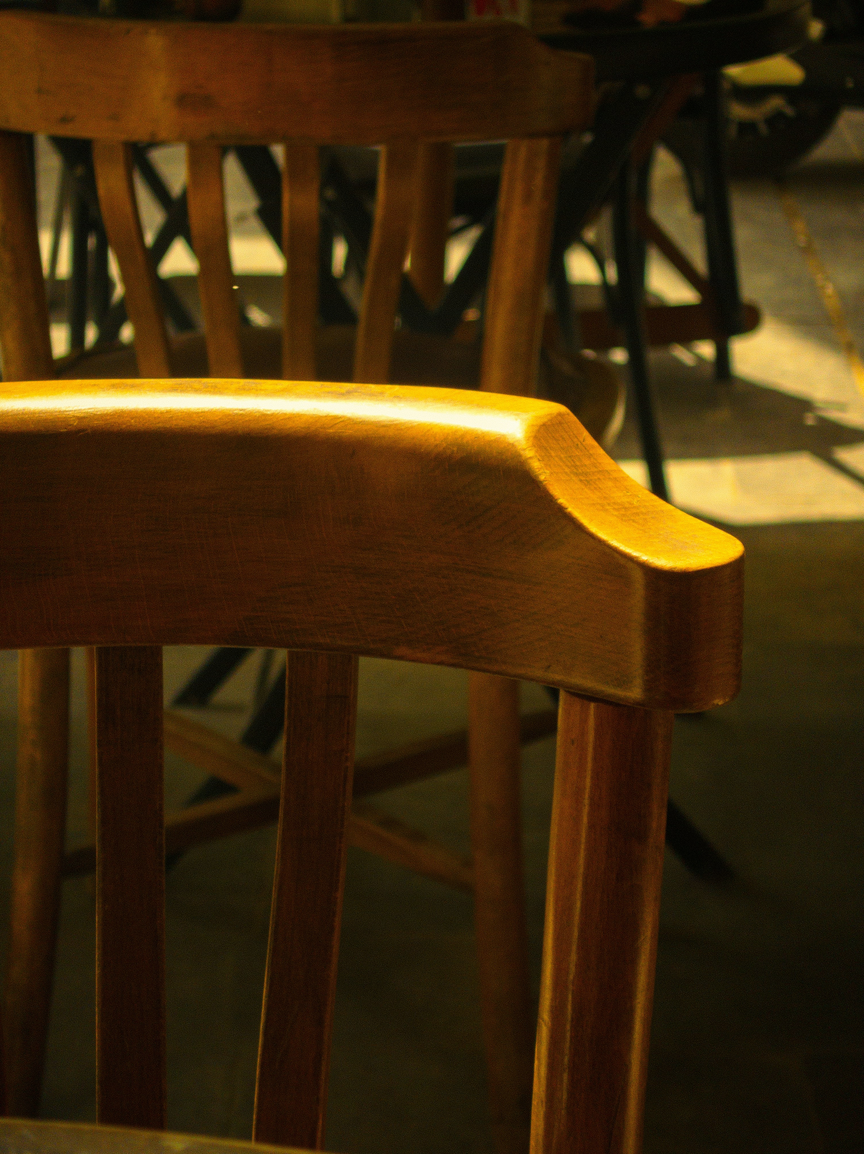 Sunlit Wooden Armrest: Craft in Warm Focus