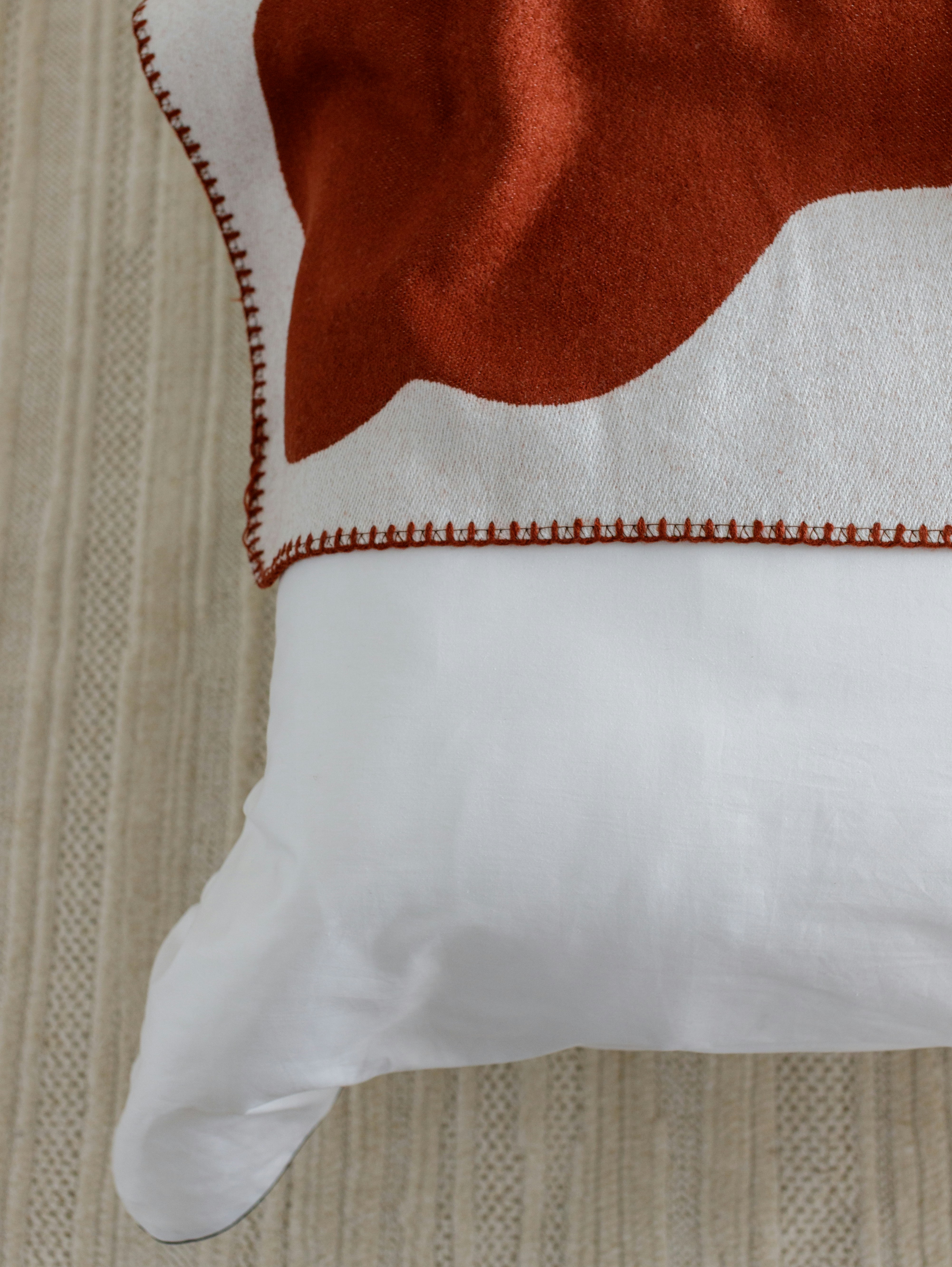 Cozy Corner: A Pillowed Still Life on Textured Linen