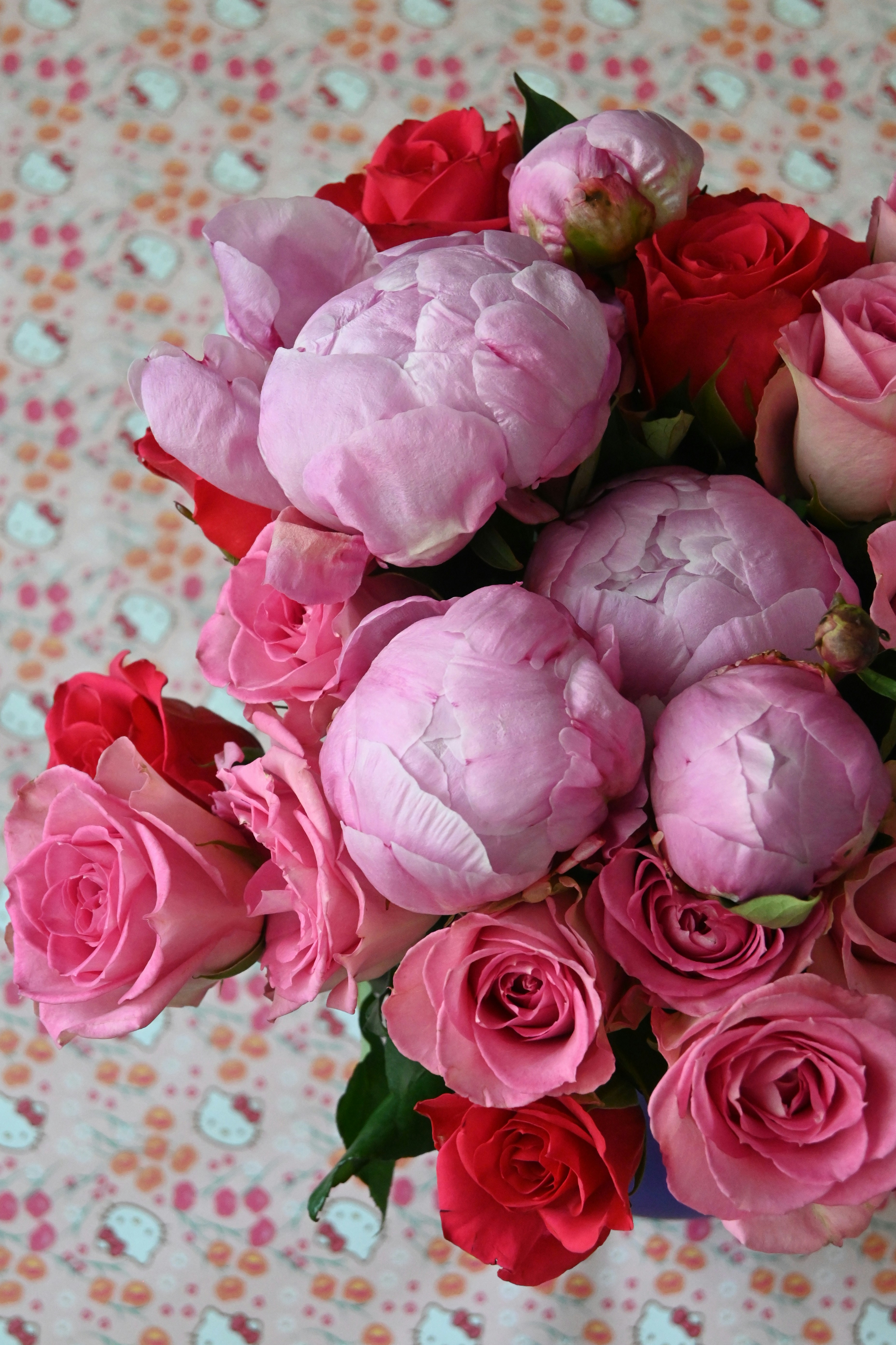 Bouquet in Bloom: Soft Pink Peonies Meet Rosy Florals