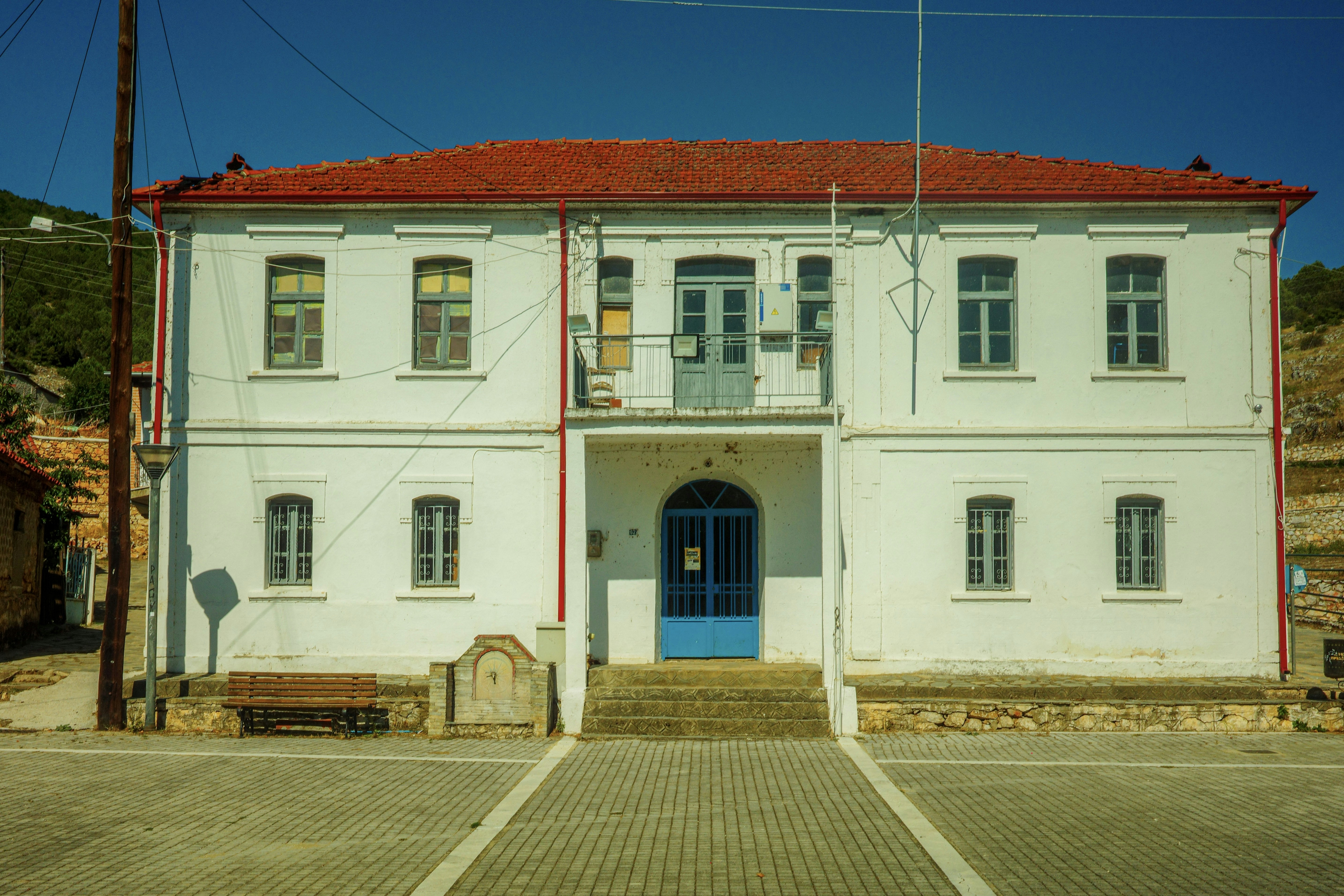 Symmetrical Town Hall: Blue Door at Center Stage