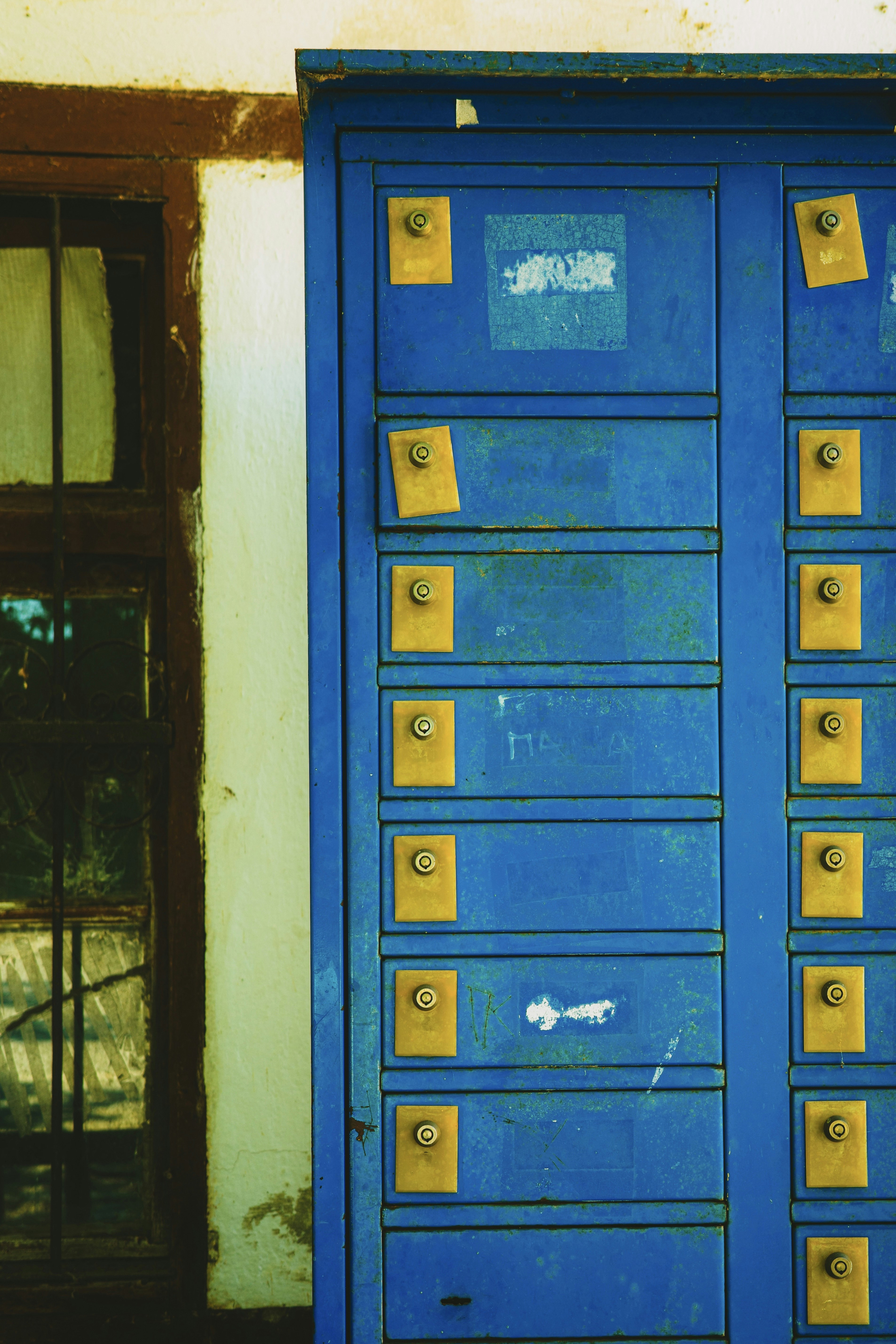 Blue Mailboxes in Morning Sun