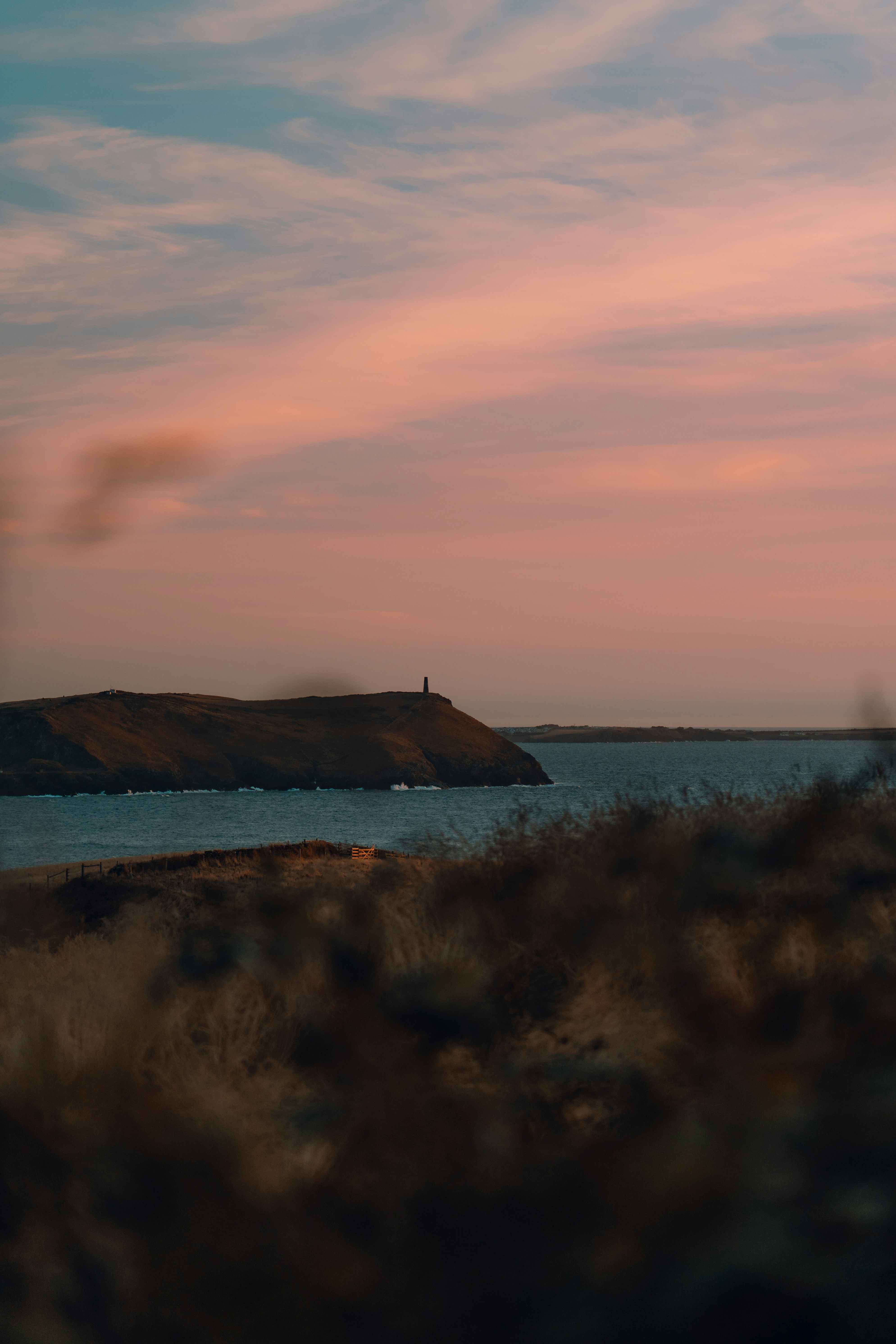 Golden Quiet: Sunset Over a Coastal Bluff