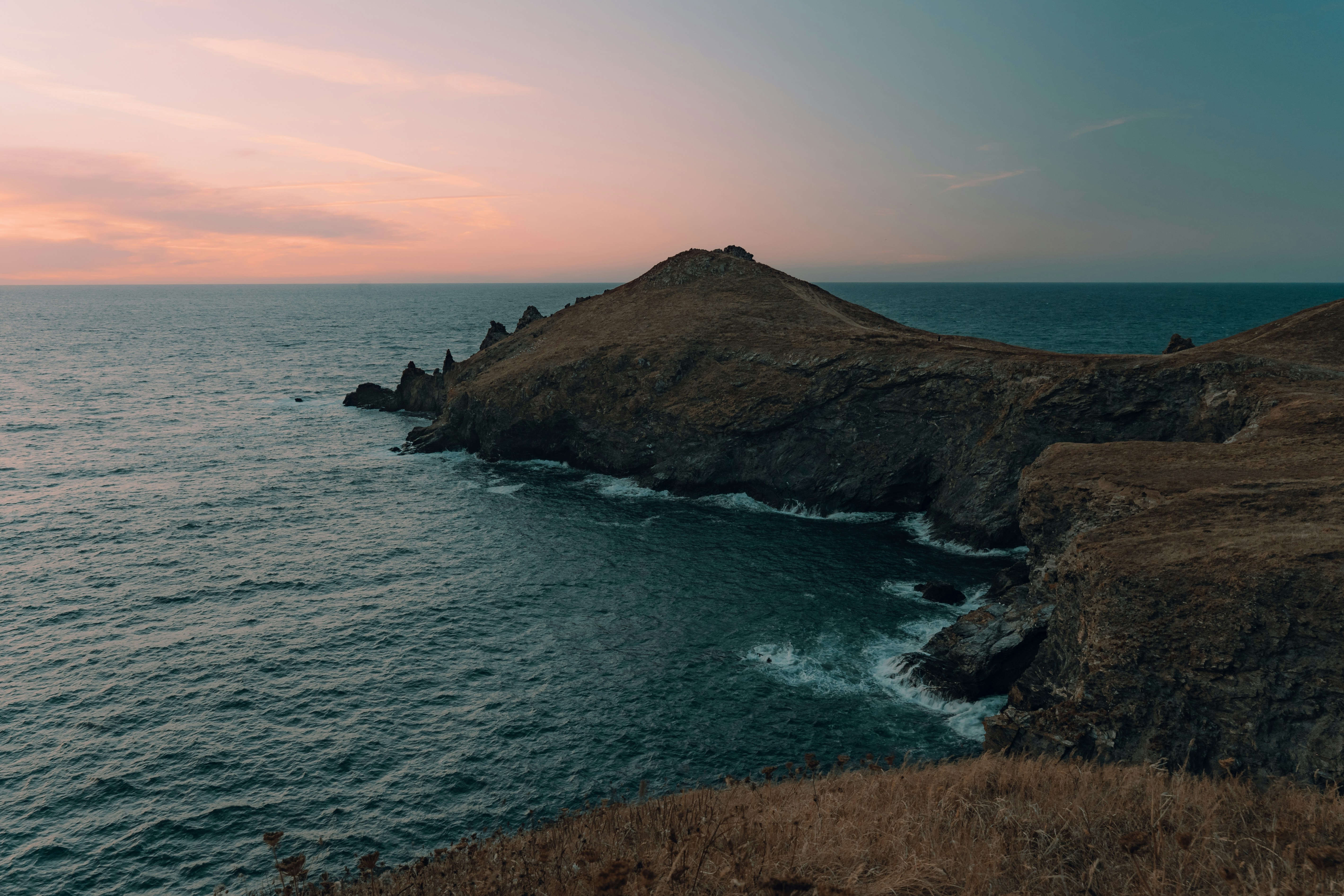 Cliff Promontory Draped in Coastal Dusk