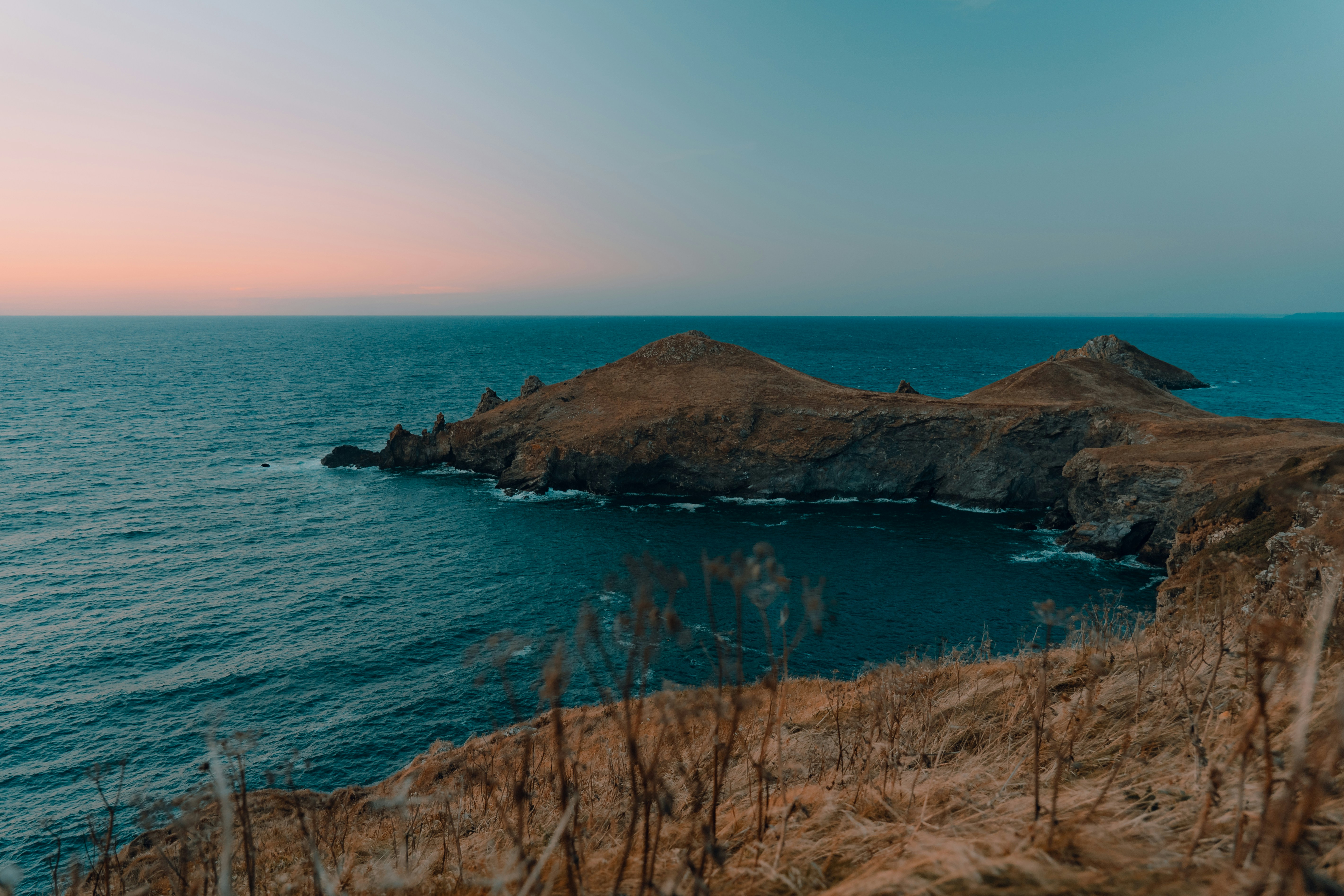 Muted Sunset Over Wind-Worn Peninsula