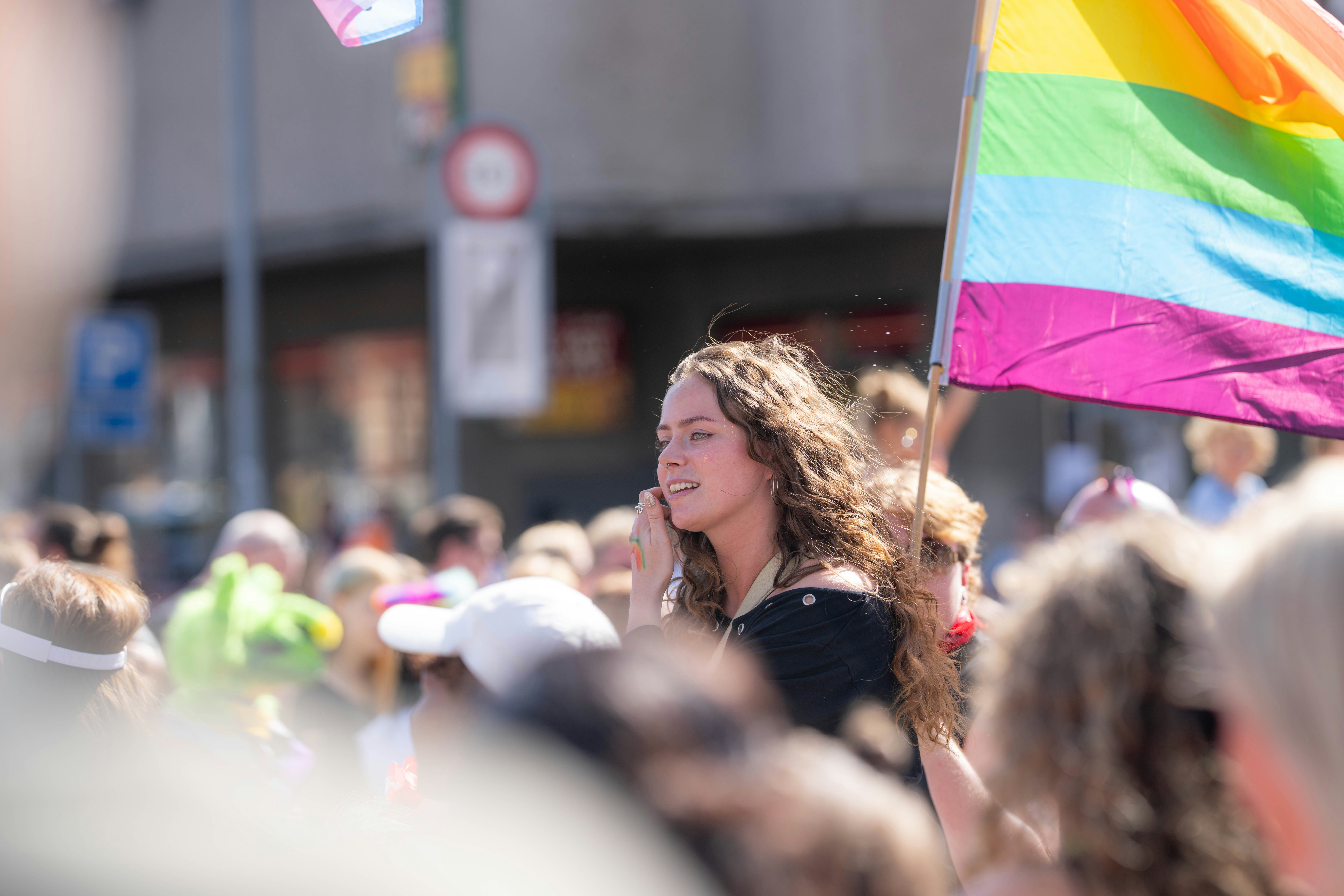 Eyes on the Rainbow: A Portrait of Hope in the Pride Parade Crowd
