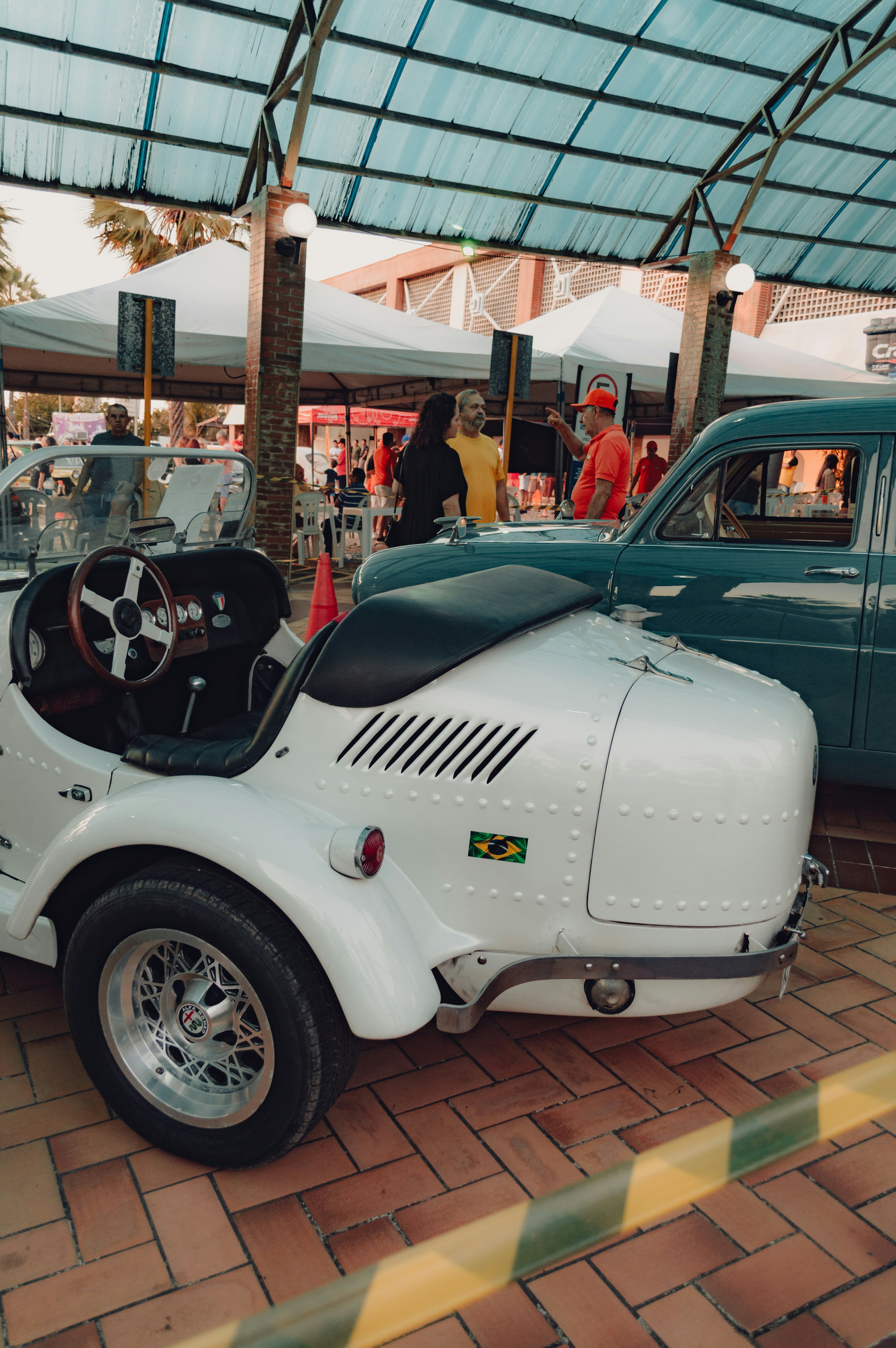 Retro Roadster Under A Market Canopy