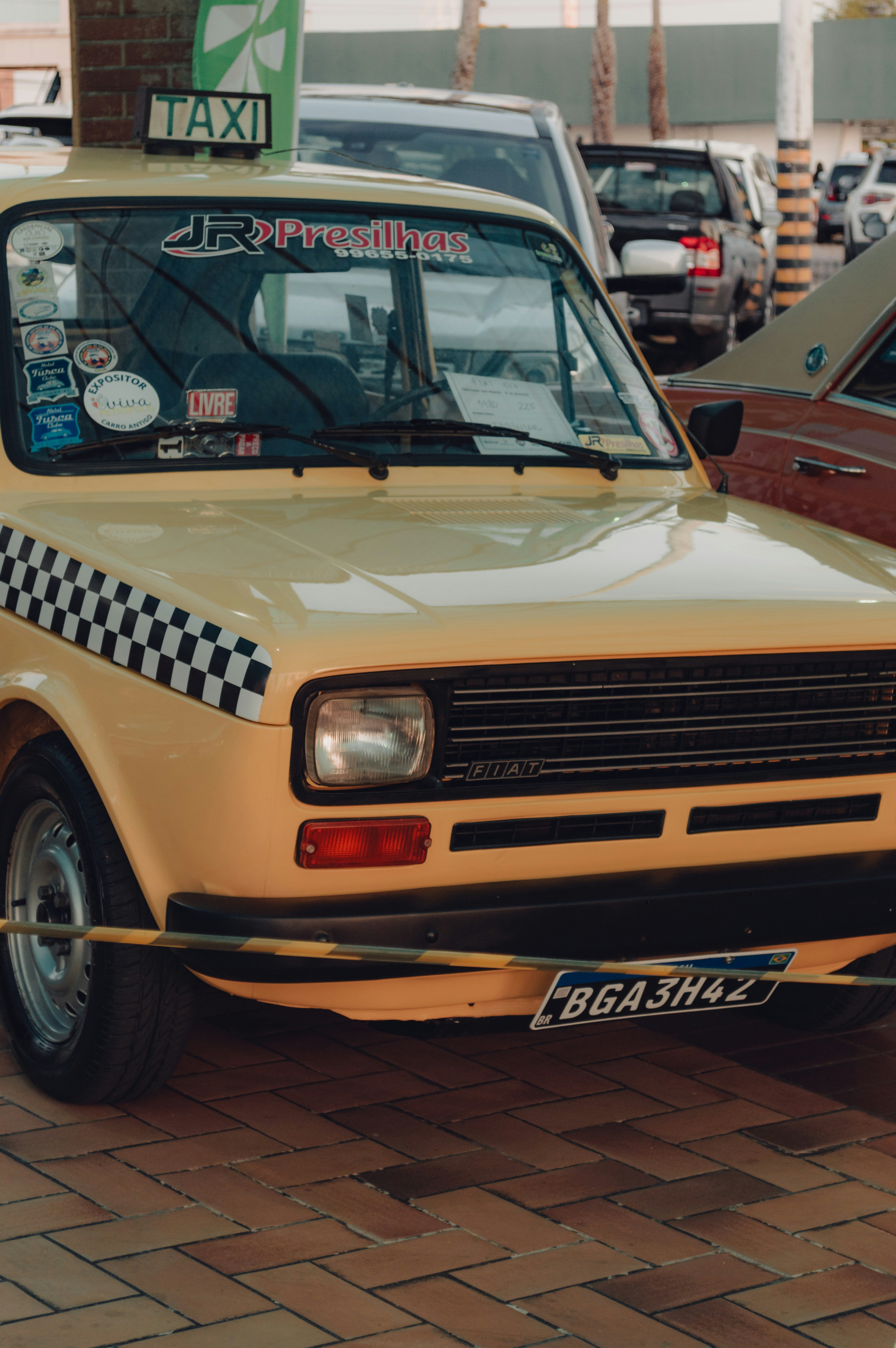 Sunlit Taxi Stand: A Classic Ceará Cab Waiting in the Spotlight