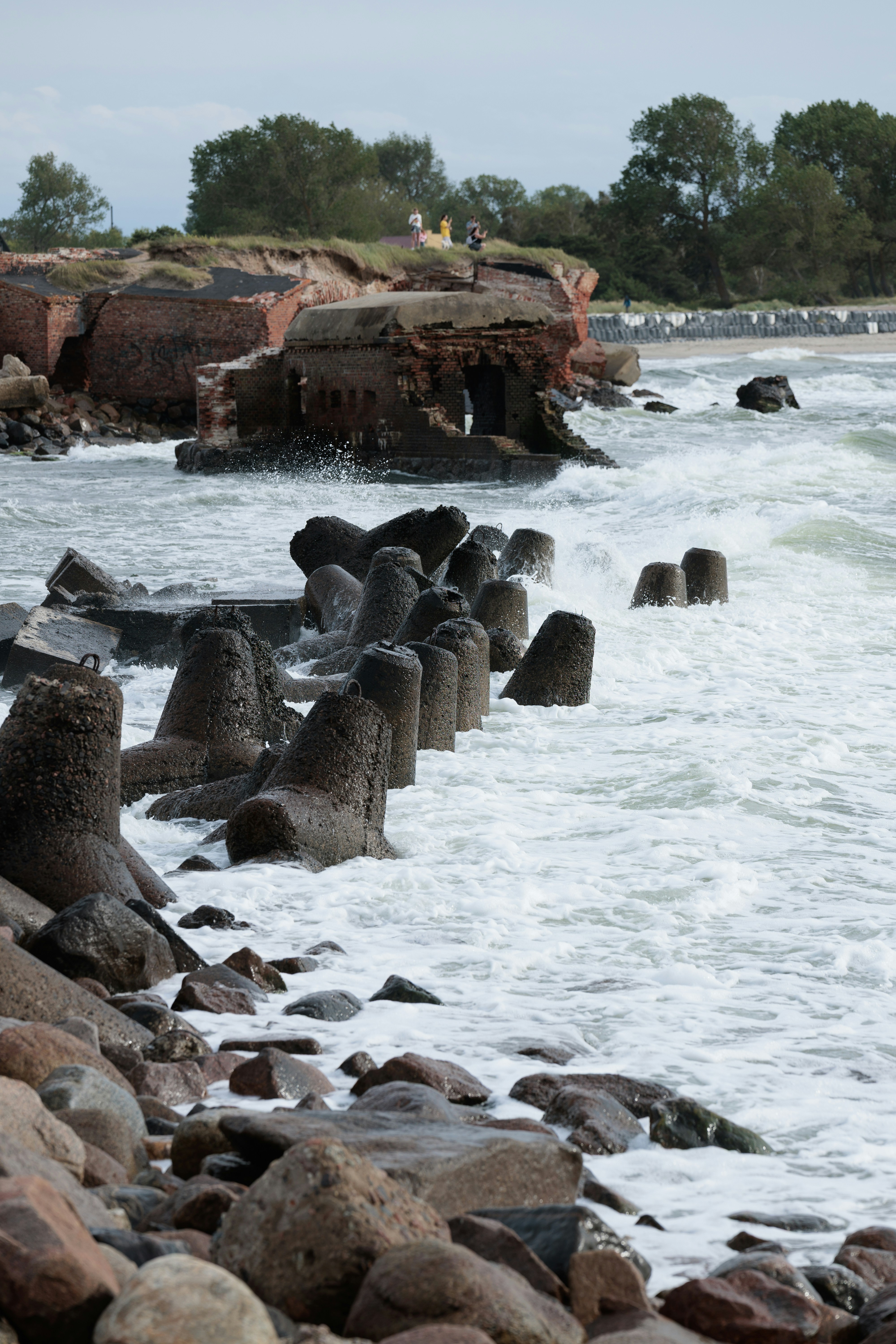 Rugged Sea Forts and Breakers: Stones, Foam, and a Distant Shoreline