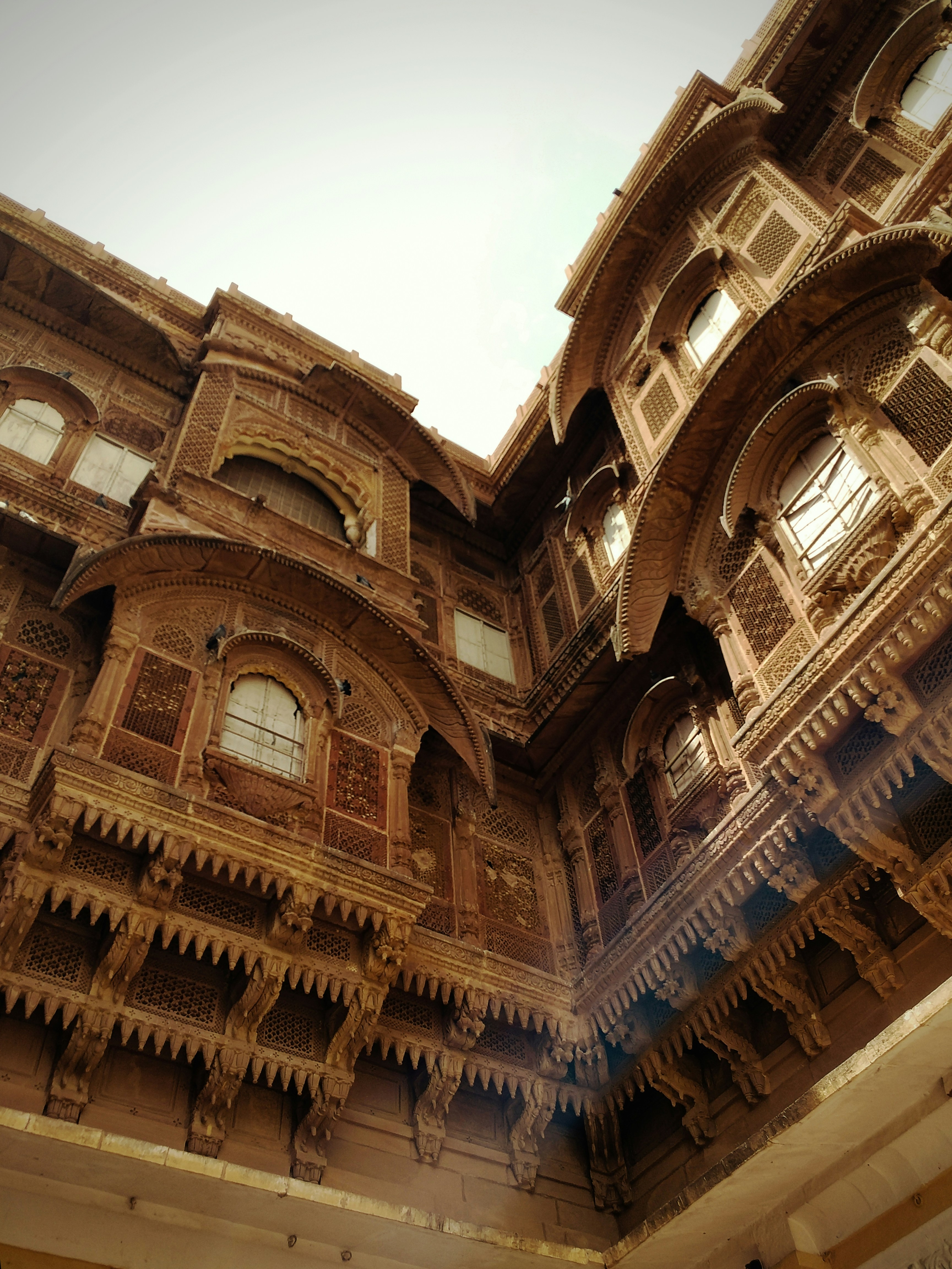 Intricate Carved Facades Beneath a Sunny Sky