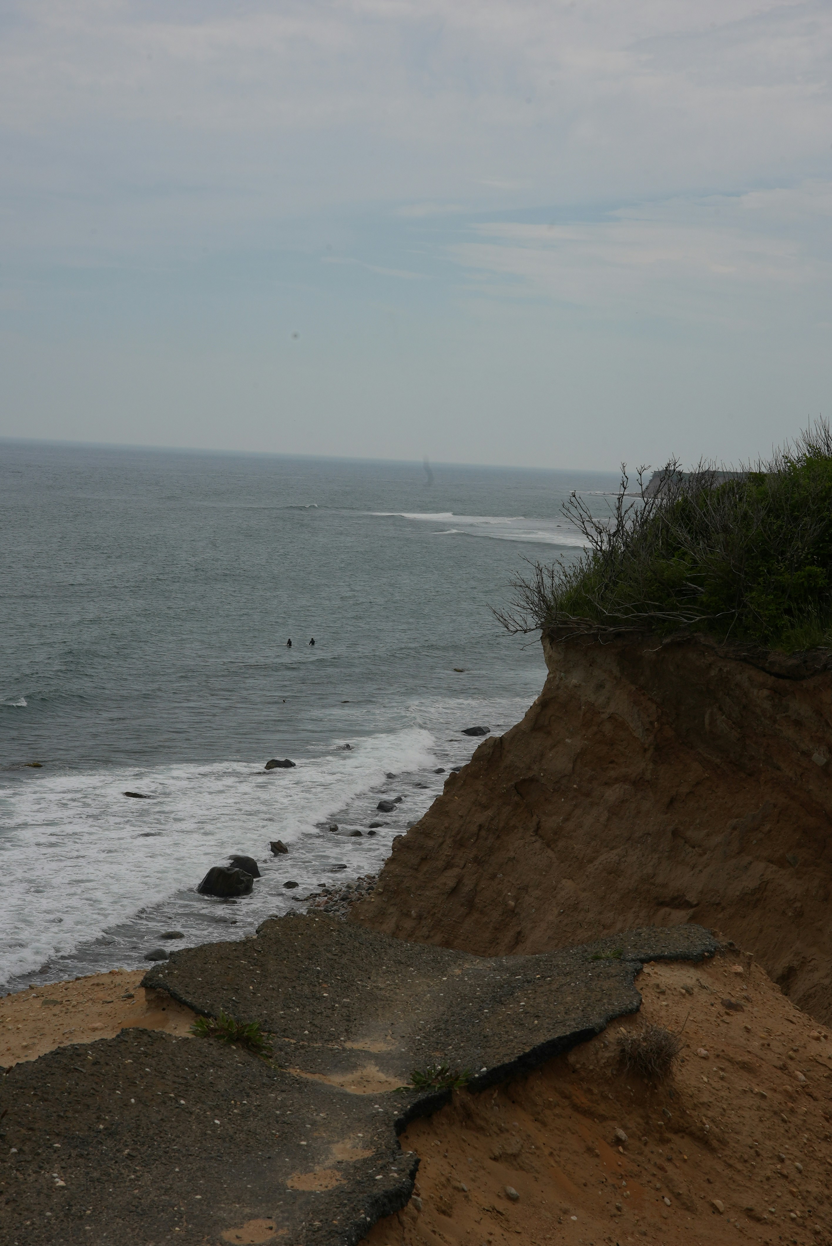 Cliffside Path Meeting the Ocean: A Quiet Shoreline Descent