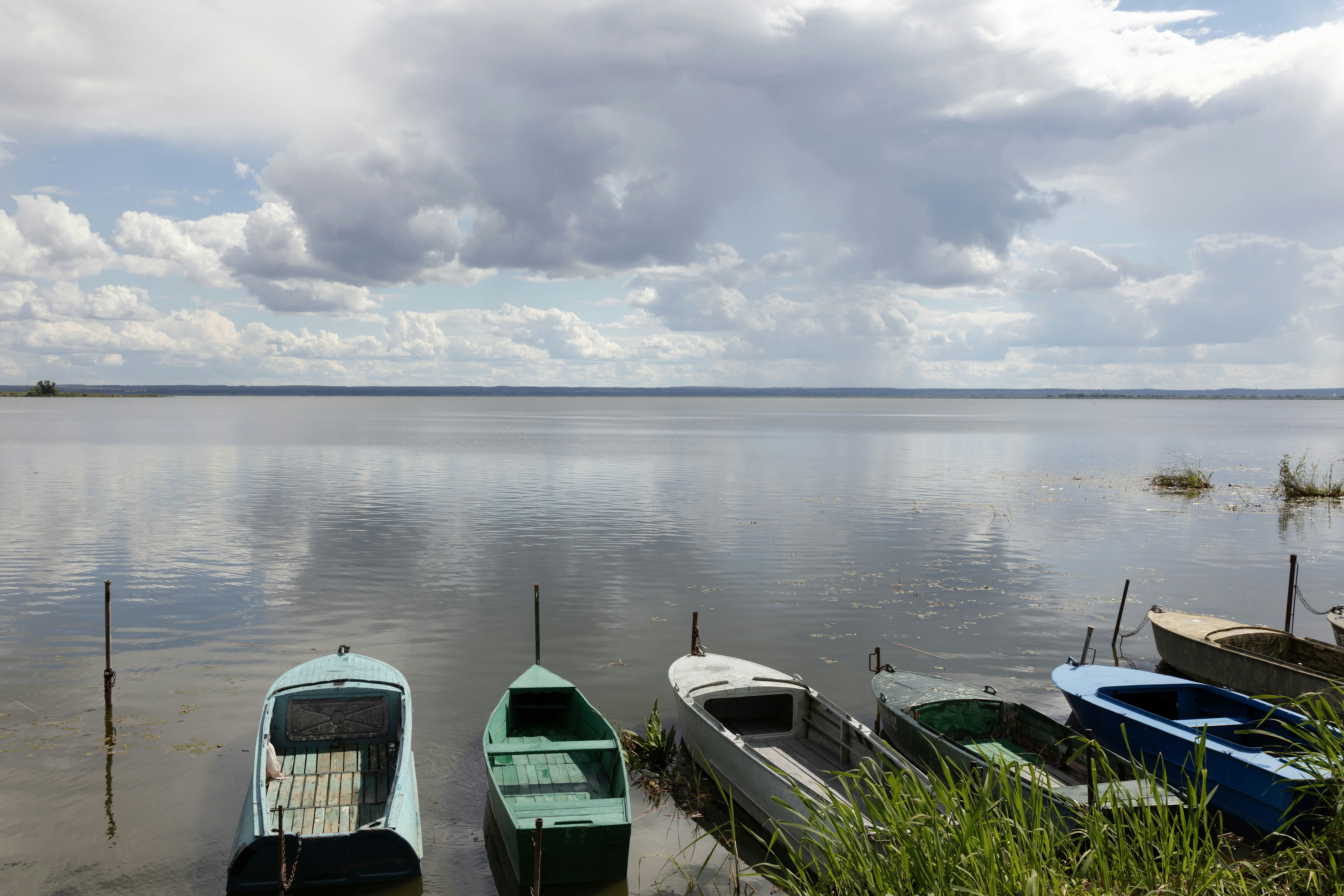 Quiet Boats at the Edge of a Serene Lake