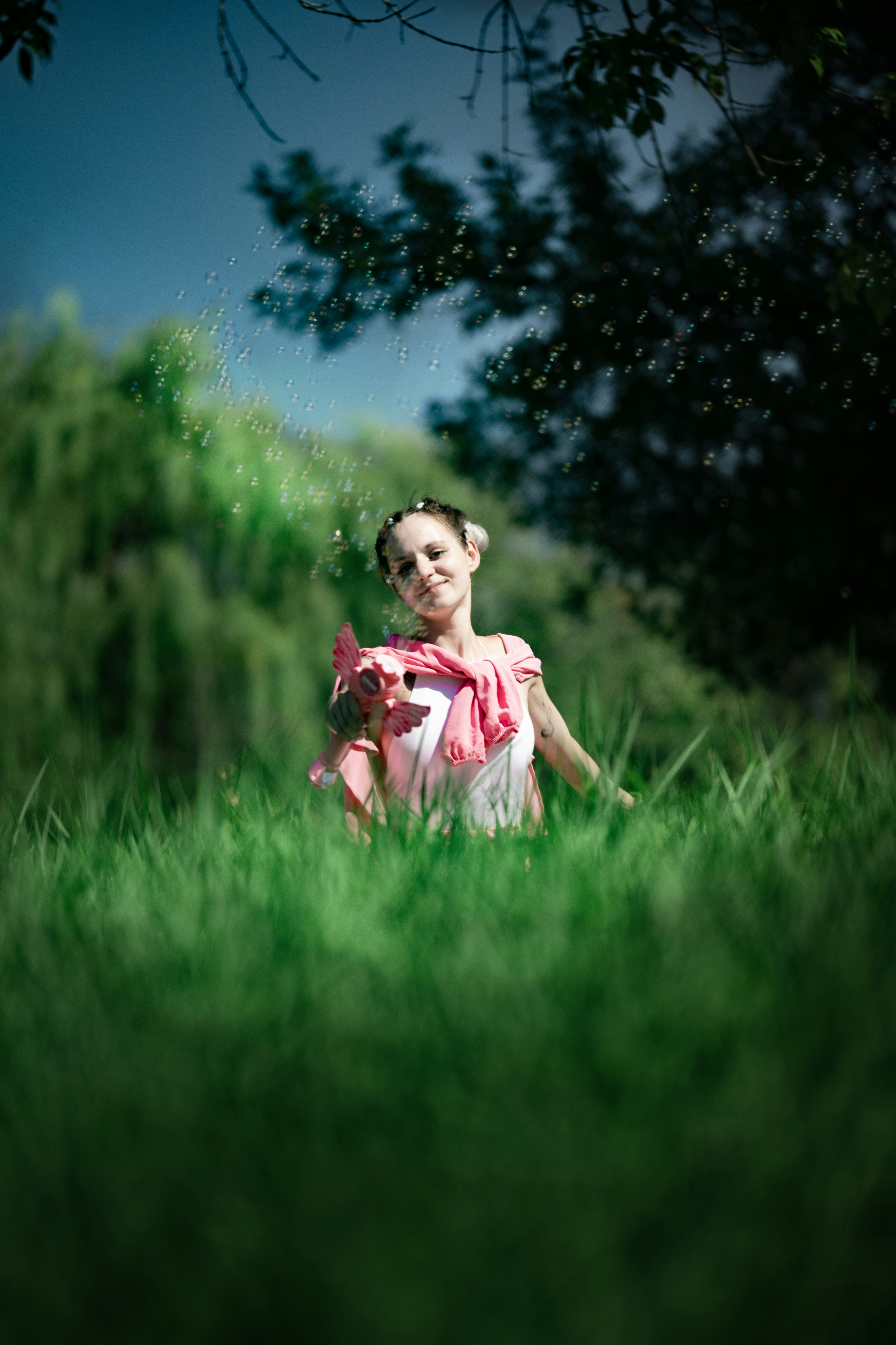 Splash of Sunshine: A Girl in the Meadow Sprays Joy