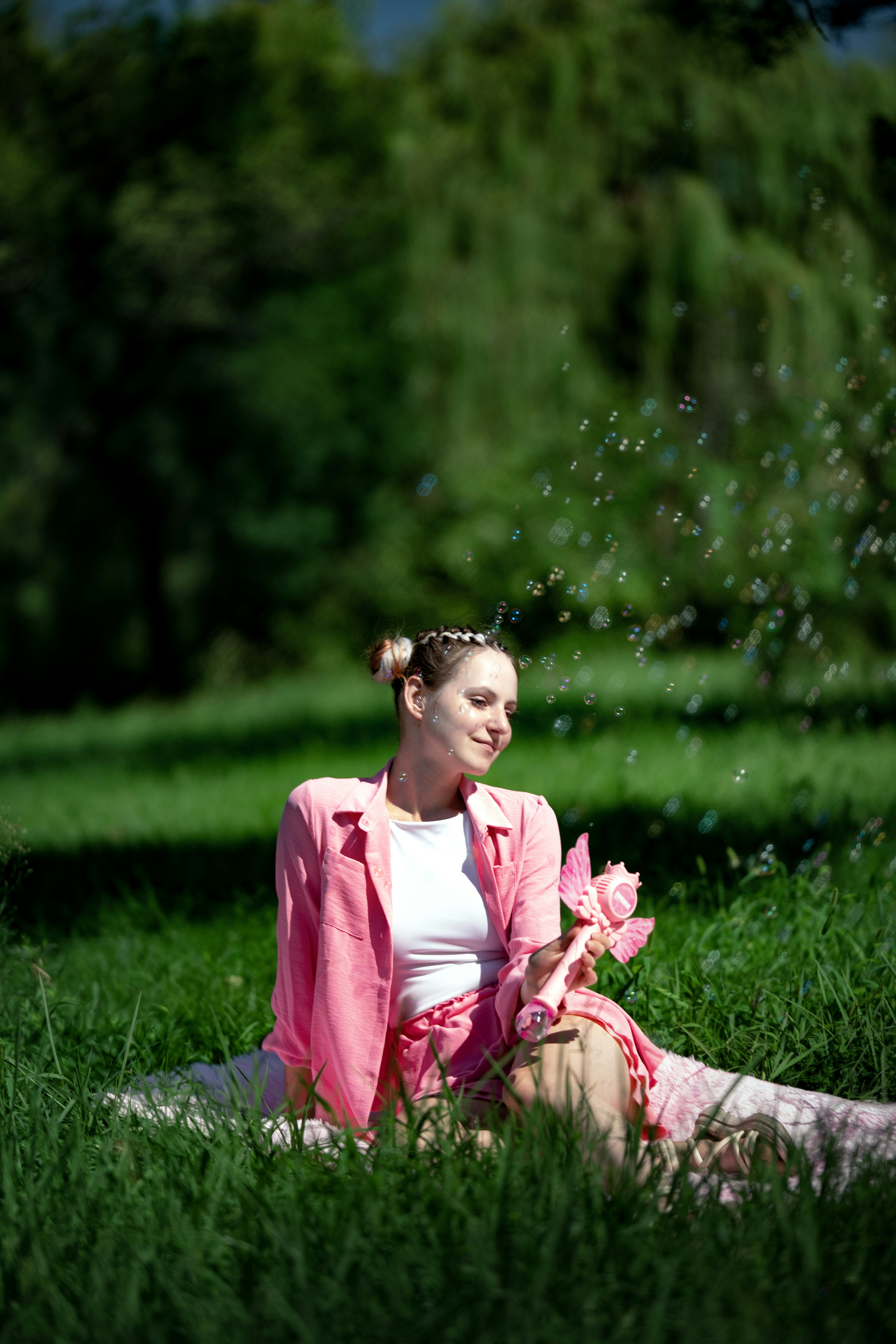Pastel Picnic: A Pink Blazer, Sunlit Grasses, and a Bouquet of Roses