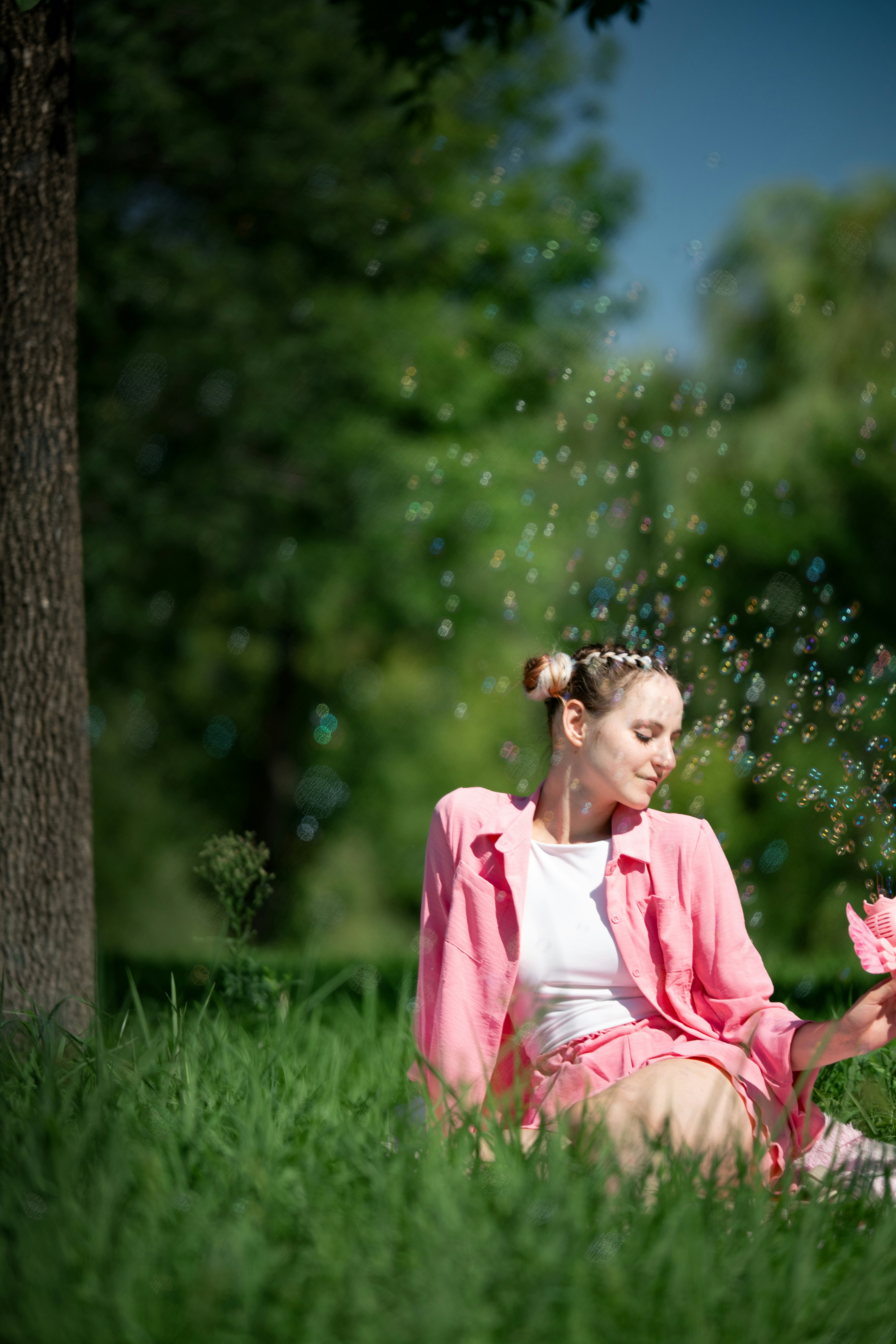 Pink Linen in the Park: A Quiet Moment of Playfulness