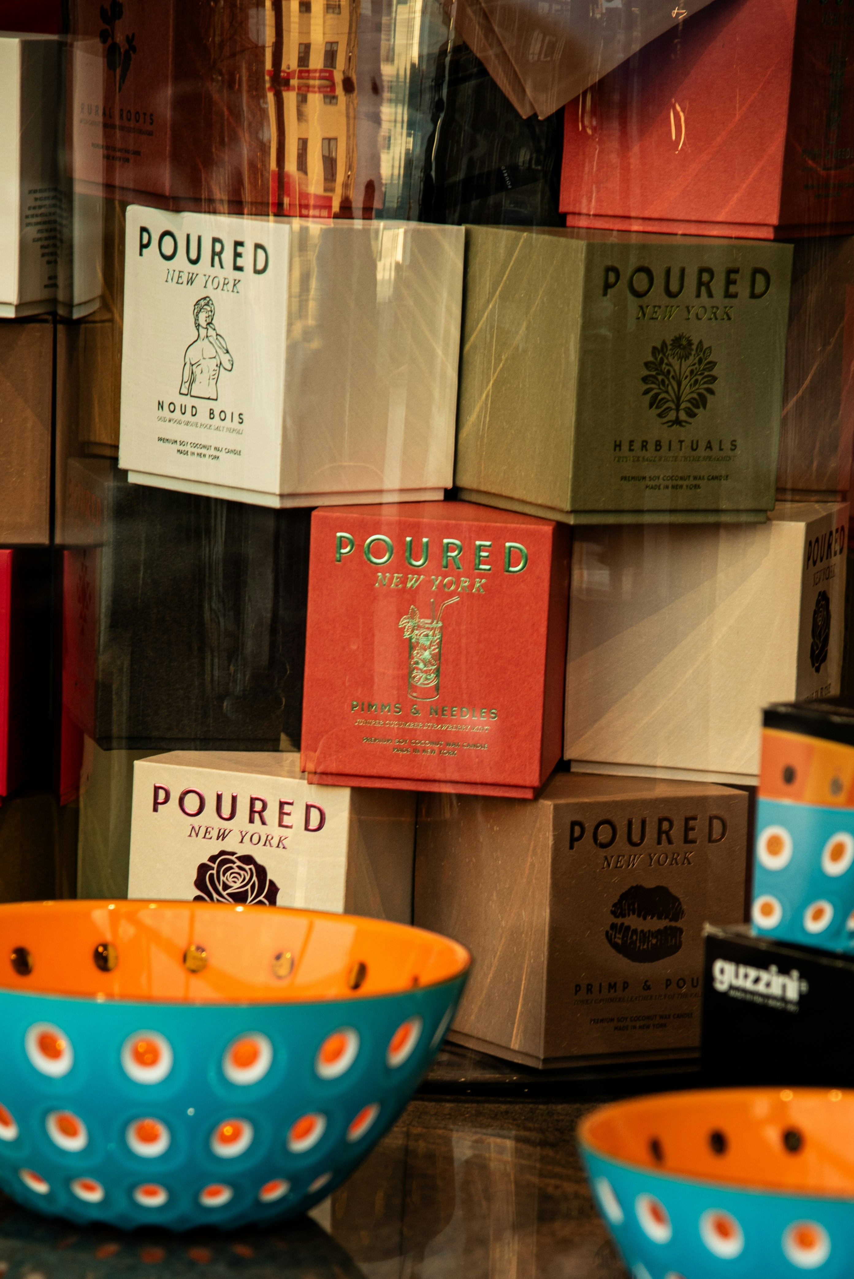 Stacked Poured Boxes: A Colorful Display of Fragrance On Store Shelves