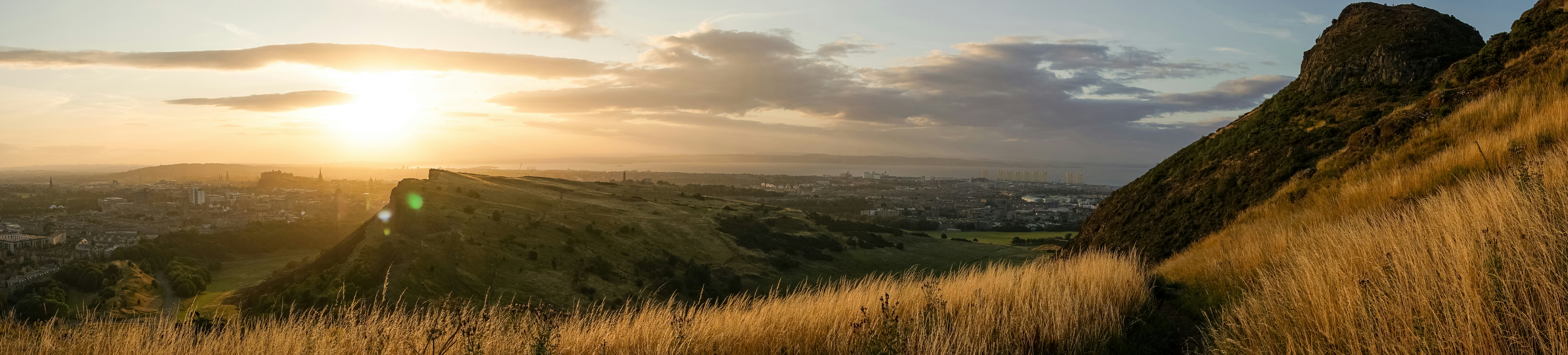 Golden Crest: A Panoramic Verge at Sunset