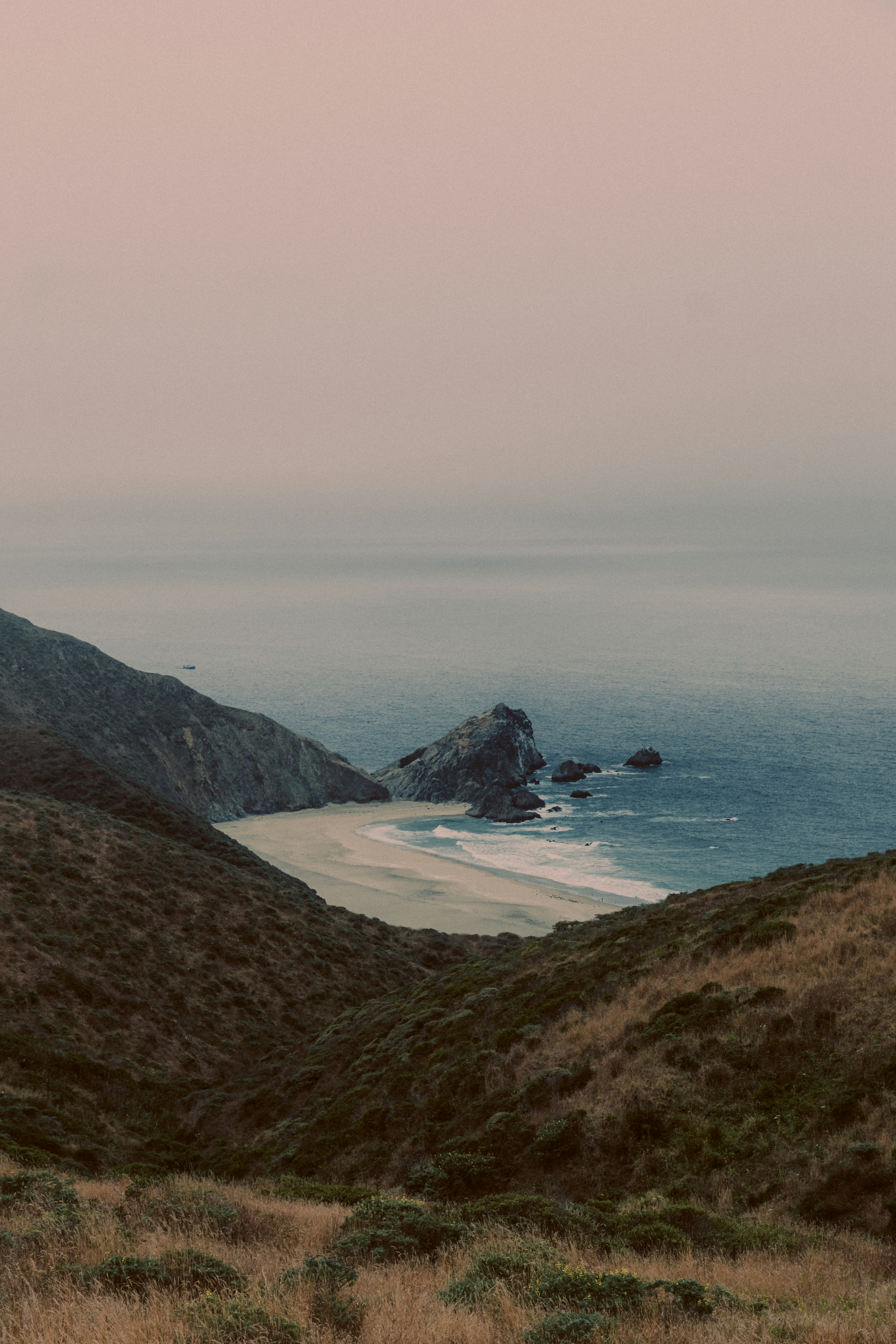 Coastal Dunes Meeting the Quiet Sea at Dusk