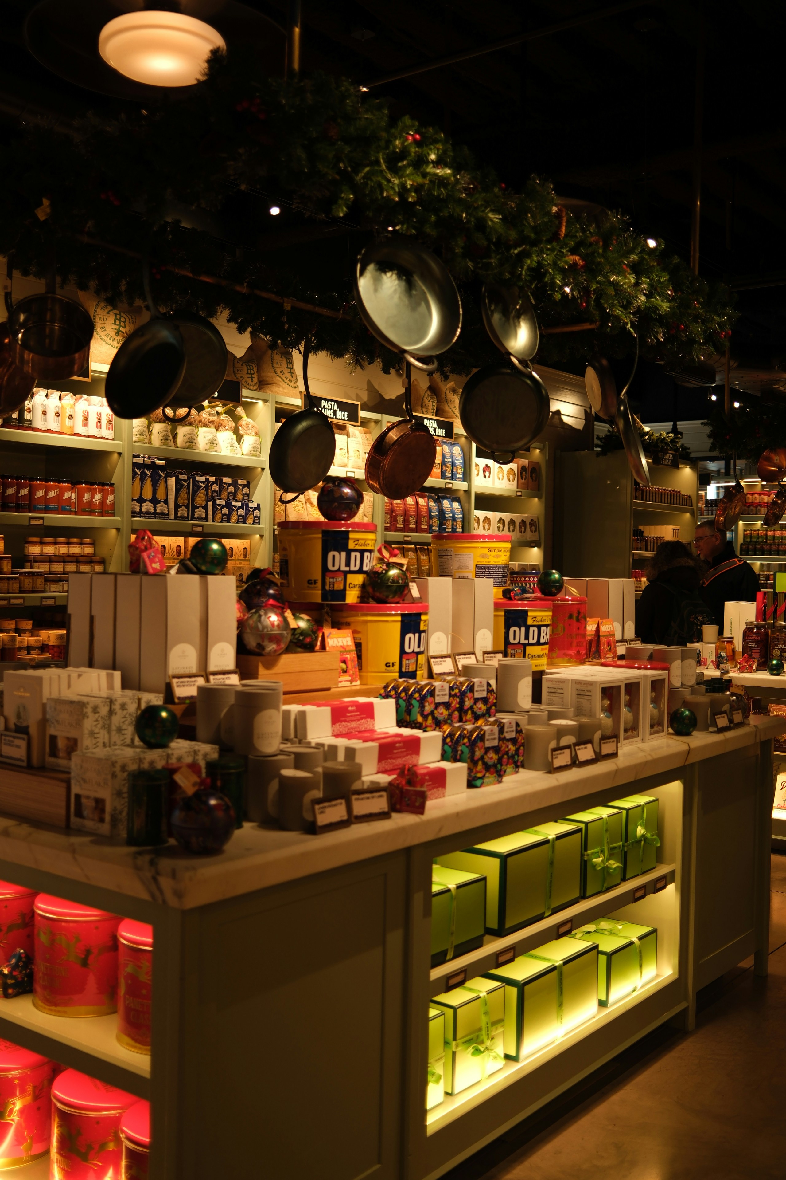 Gilded Grotto: A Warm Holiday Market Amid Hanging Pans