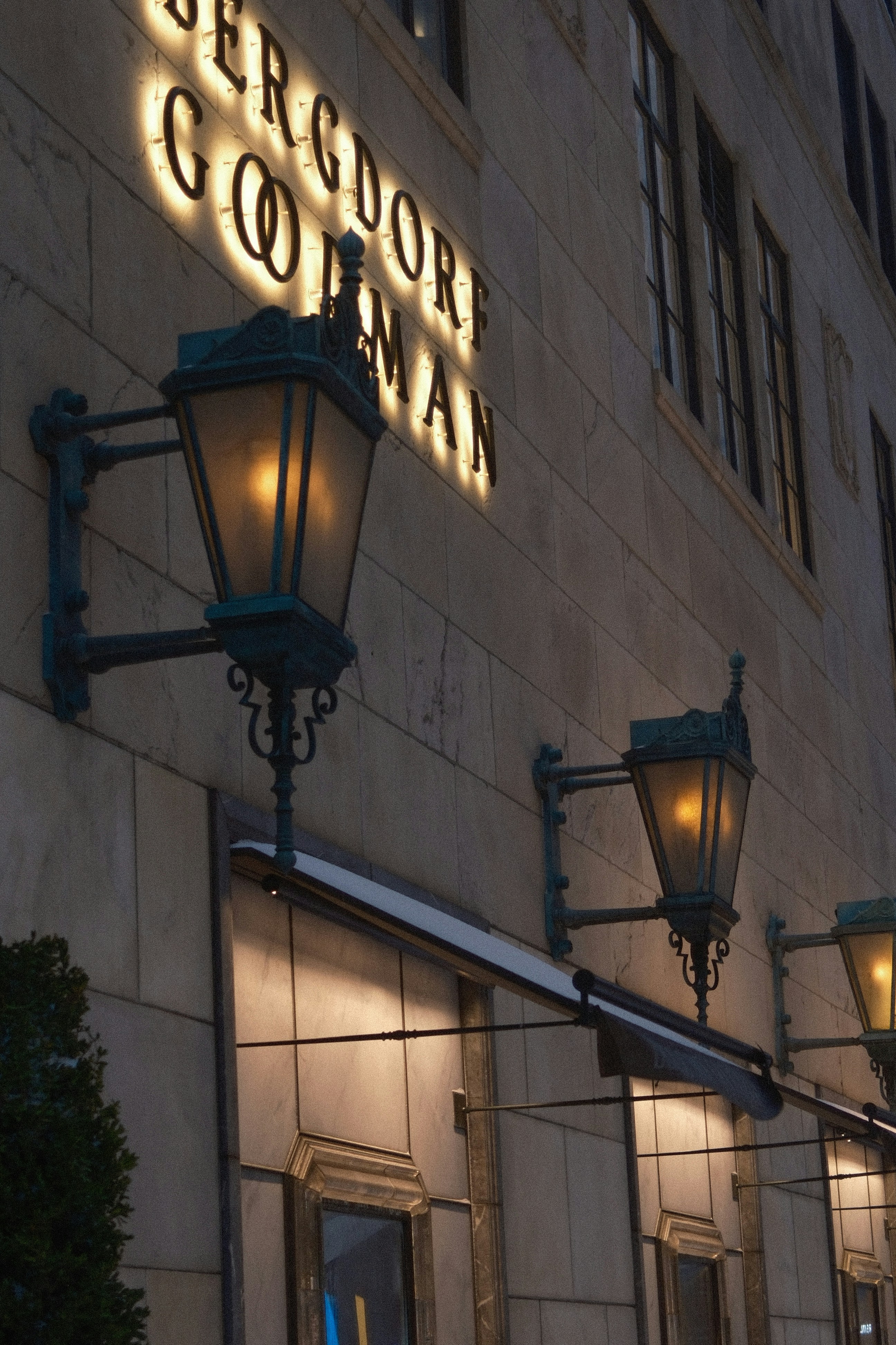 Gaslit Facade: Evening Lanterns on a Classic Corner