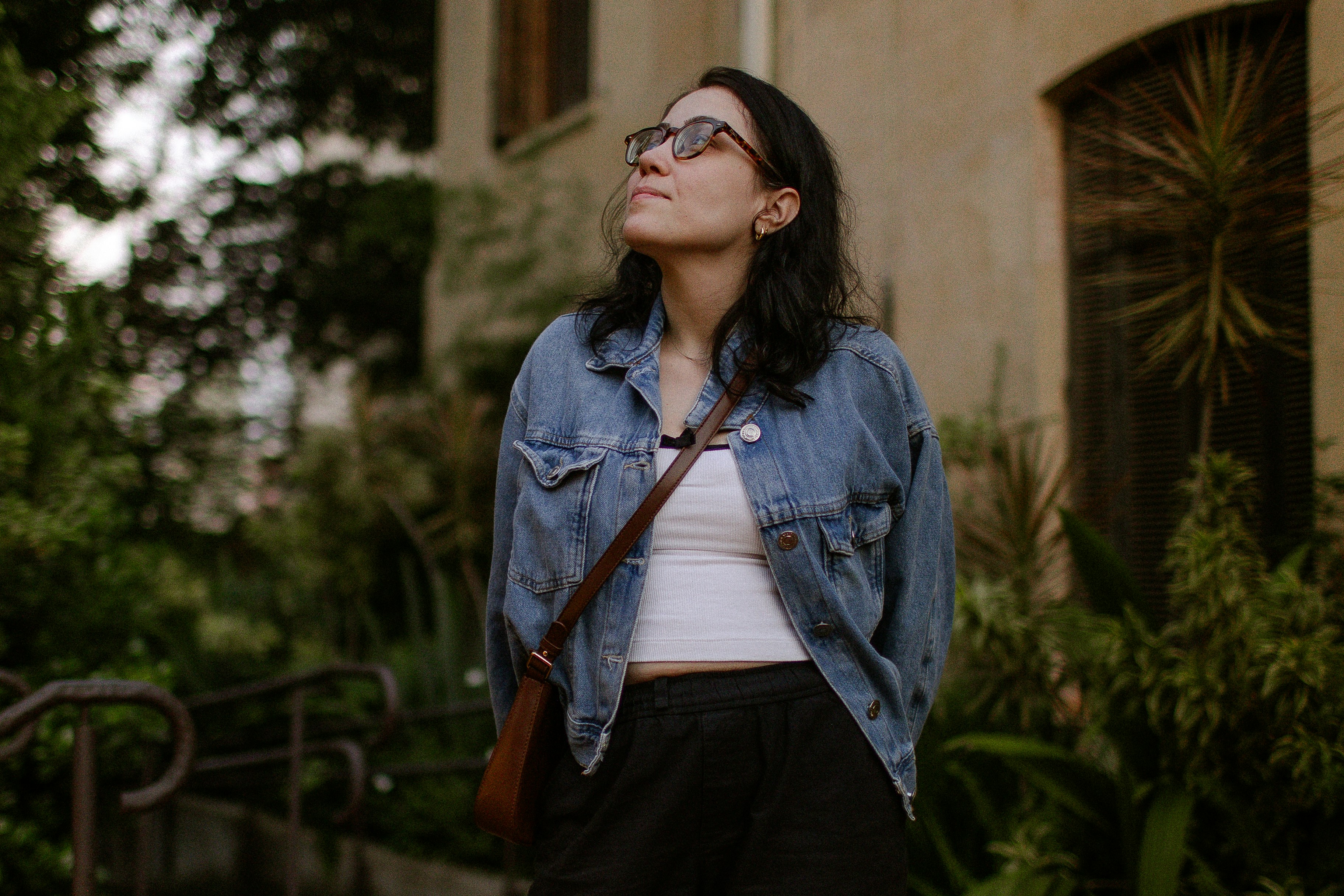 Denim and Dusk: A Quiet Portrait Under a Lime-Soaked Sky